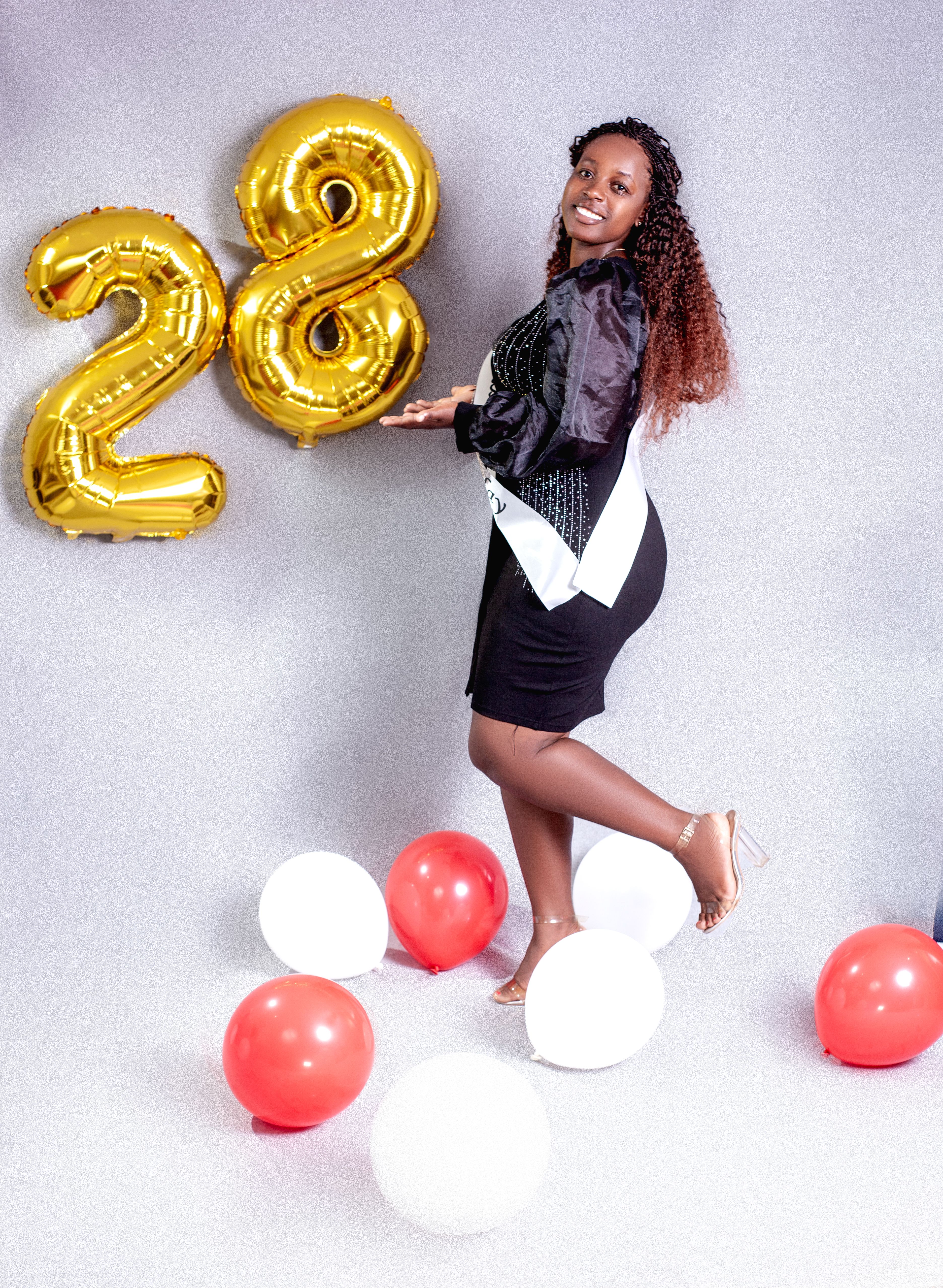 Joyful 28th Birthday Celebration with Balloons · Free Stock Photo