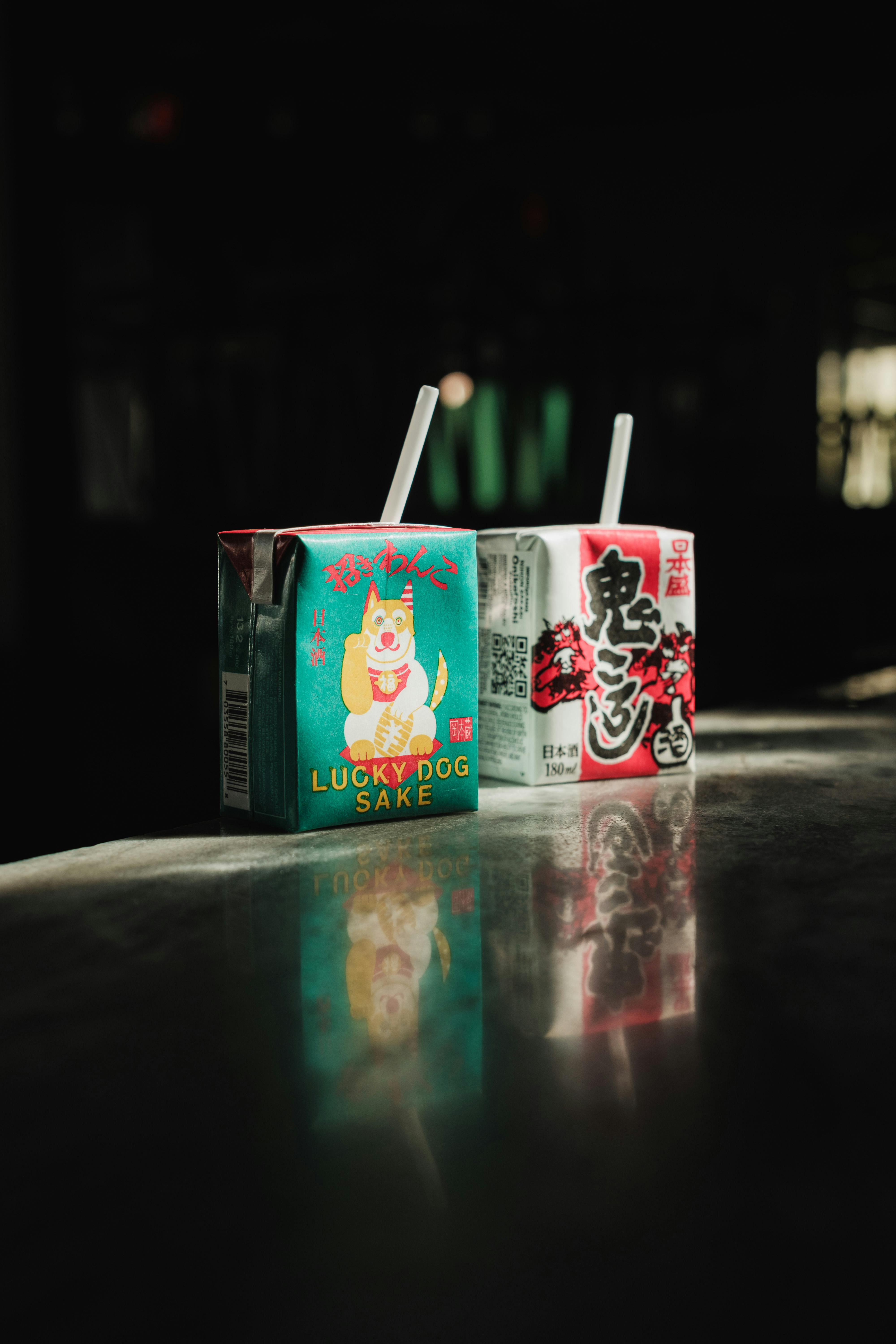 Colorful Japanese Sake Cartons with Straws · Free Stock Photo