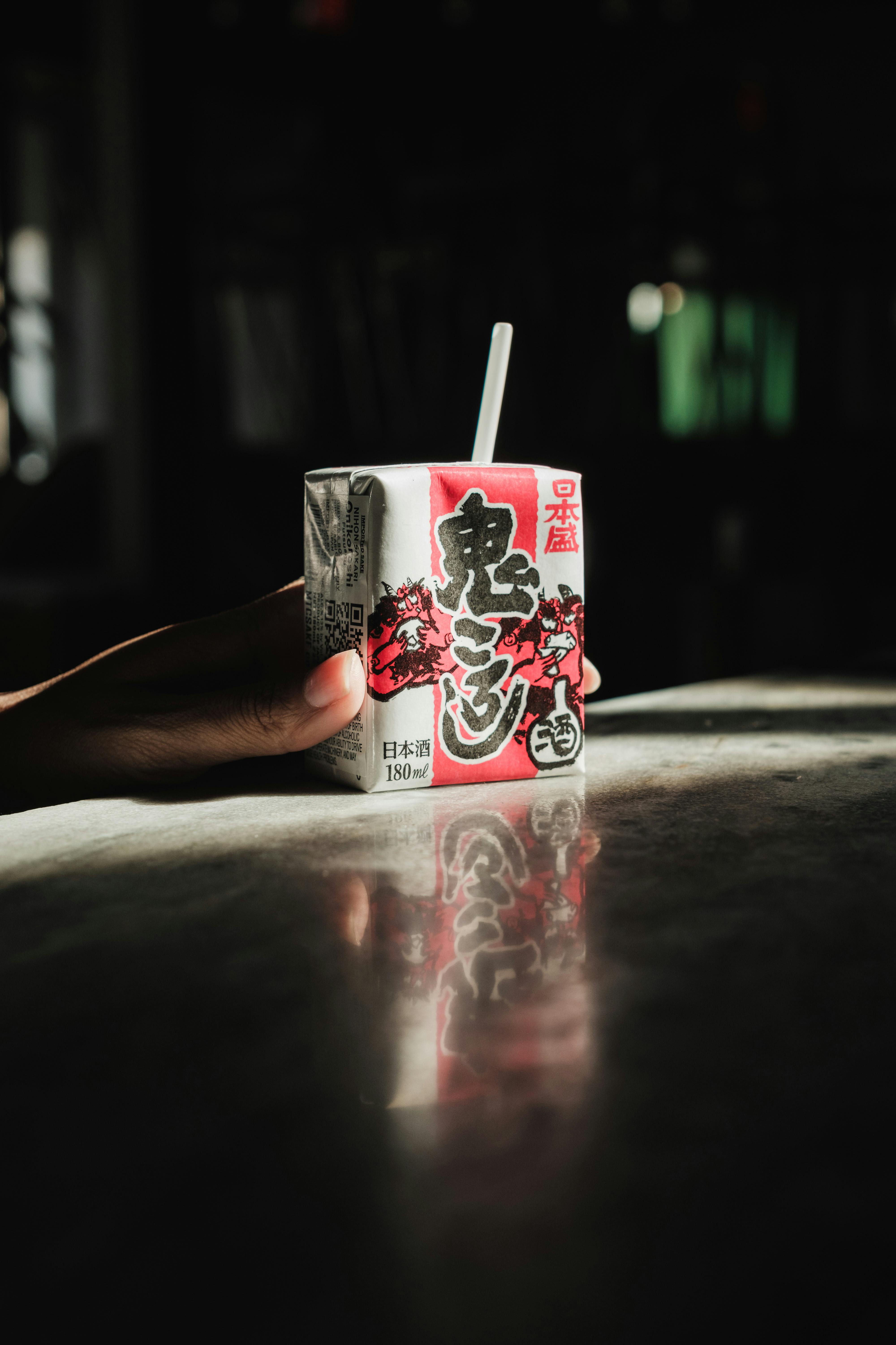 Close-up of Japanese Sake Box on Table · Free Stock Photo