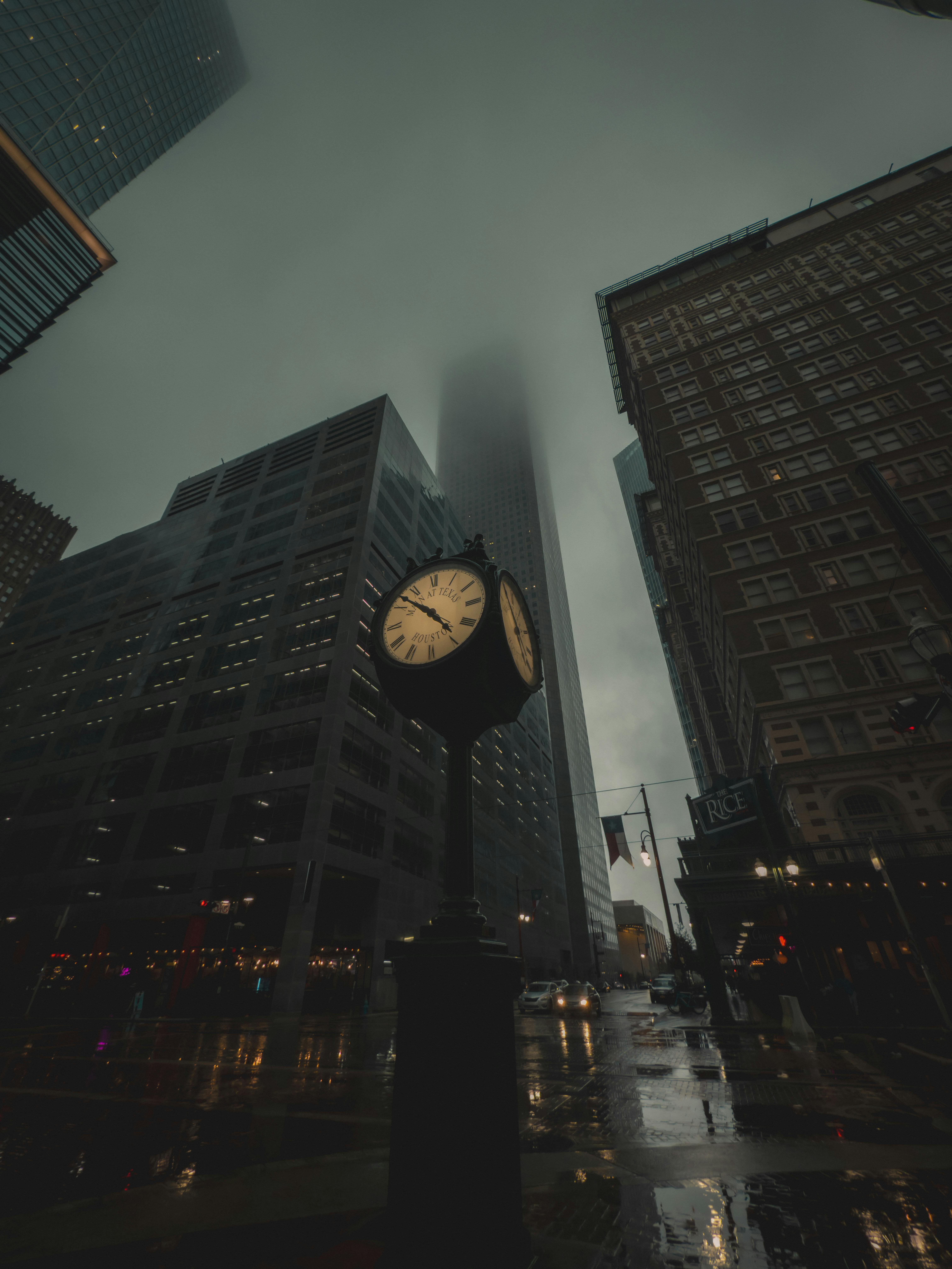 Moody Street Scene with Clock in Houston · Free Stock Photo