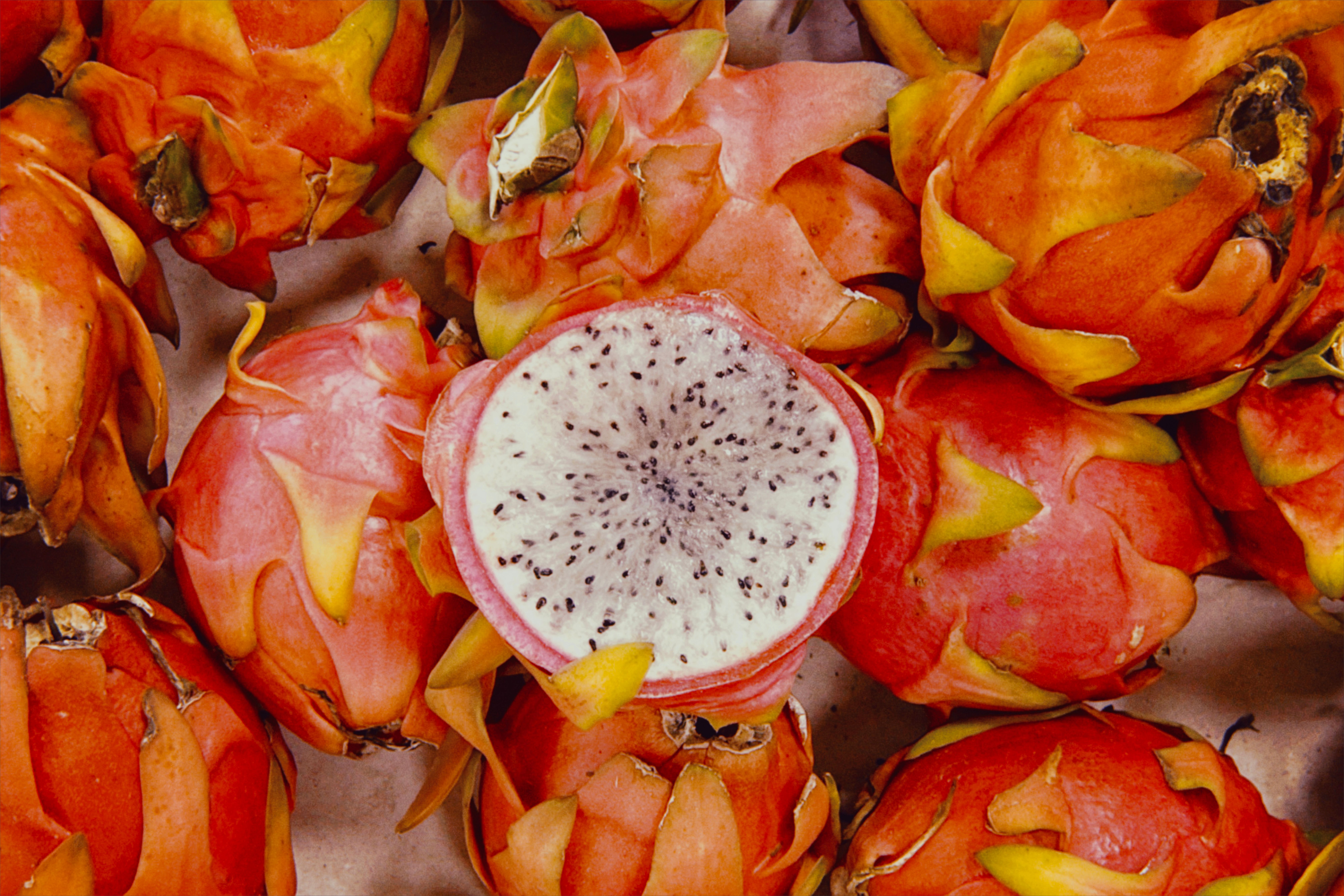 Fresh Red Dragon Fruits with Sliced Center Display · Free Stock Photo
