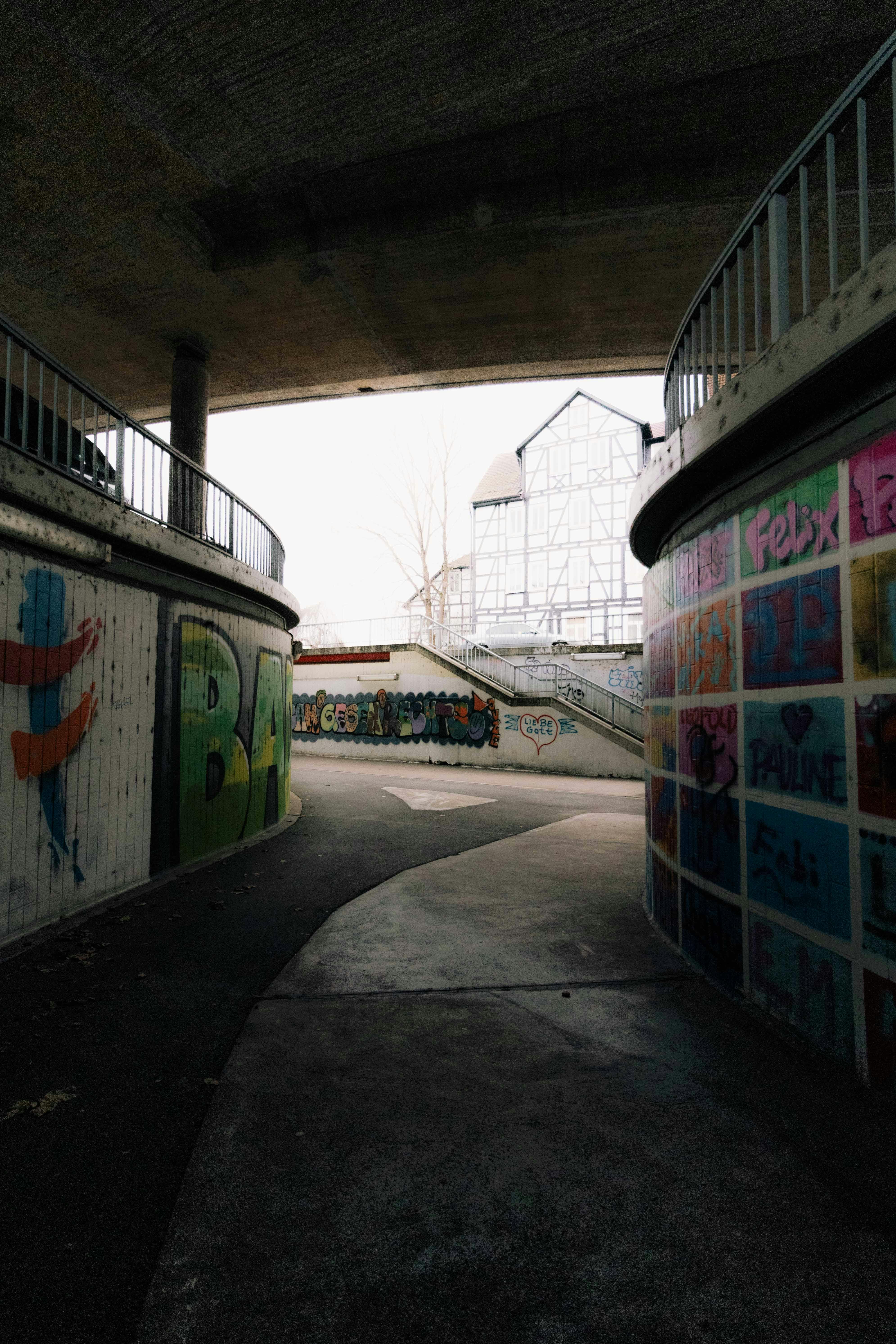 Urban Graffiti Alley Under Overpass · Free Stock Photo