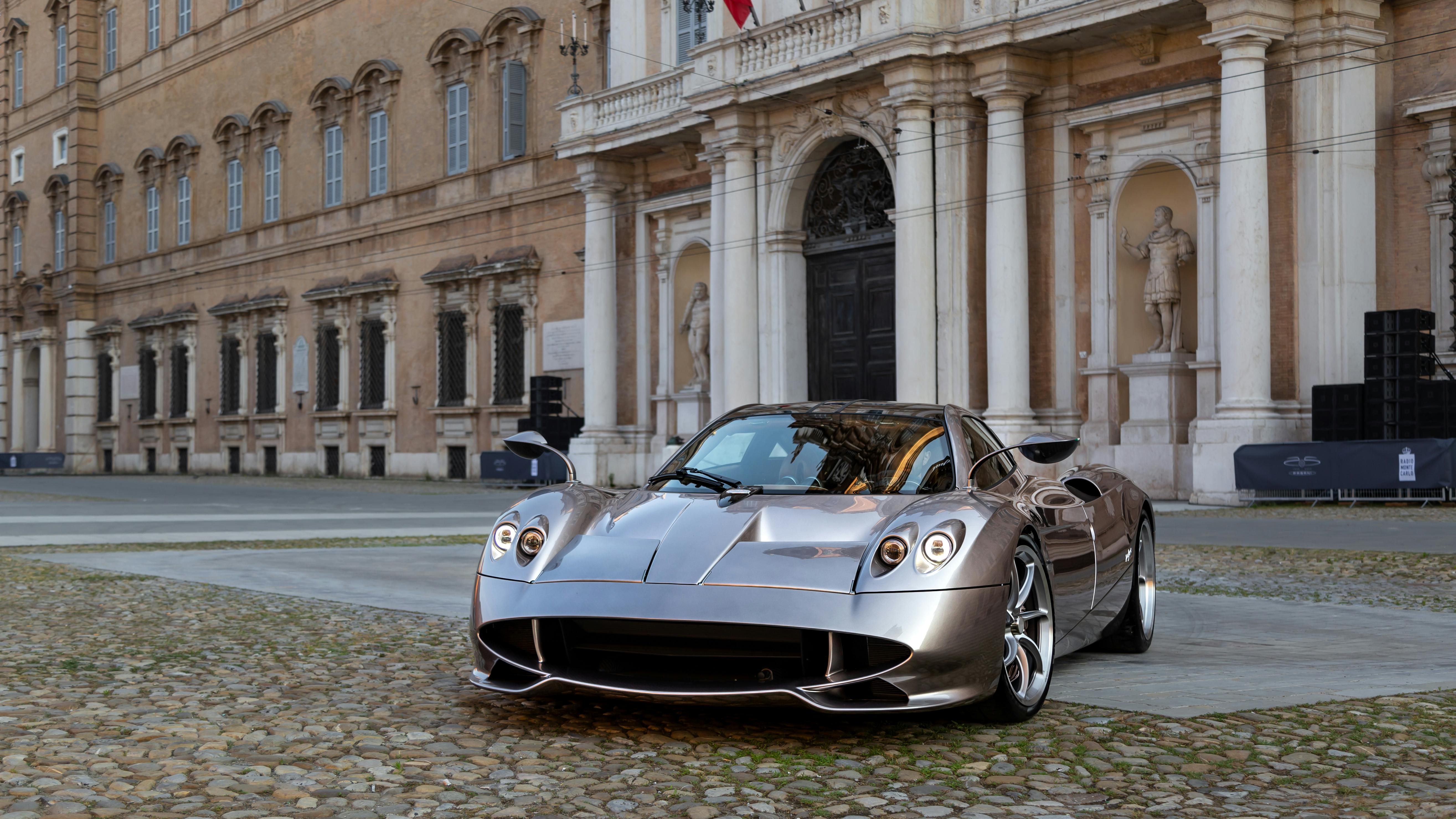 Sleek Hypercar in Historical European Setting · Free Stock Photo
