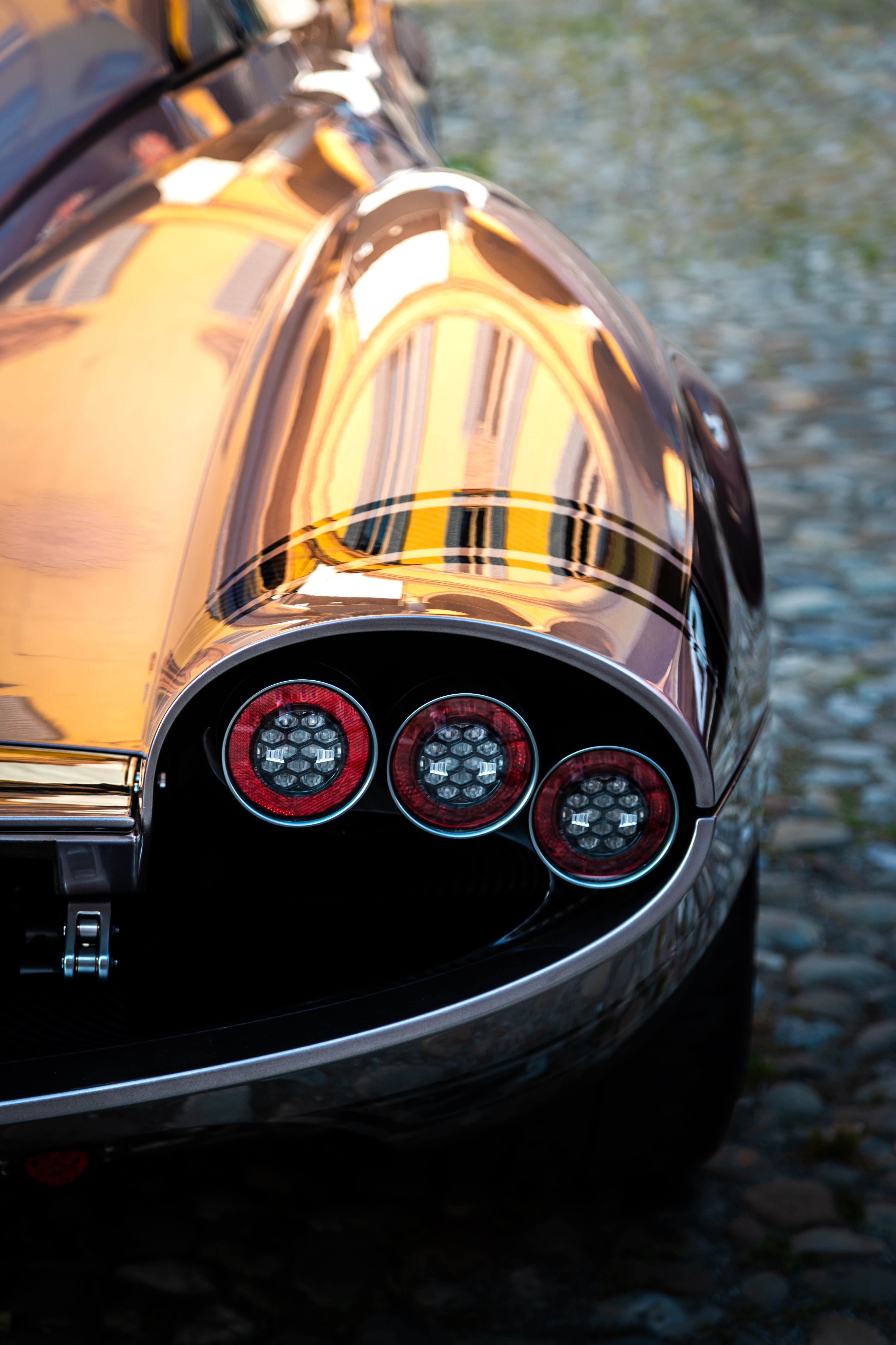 Close-up of Luxury Car Tail Light with Reflection · Free Stock Photo
