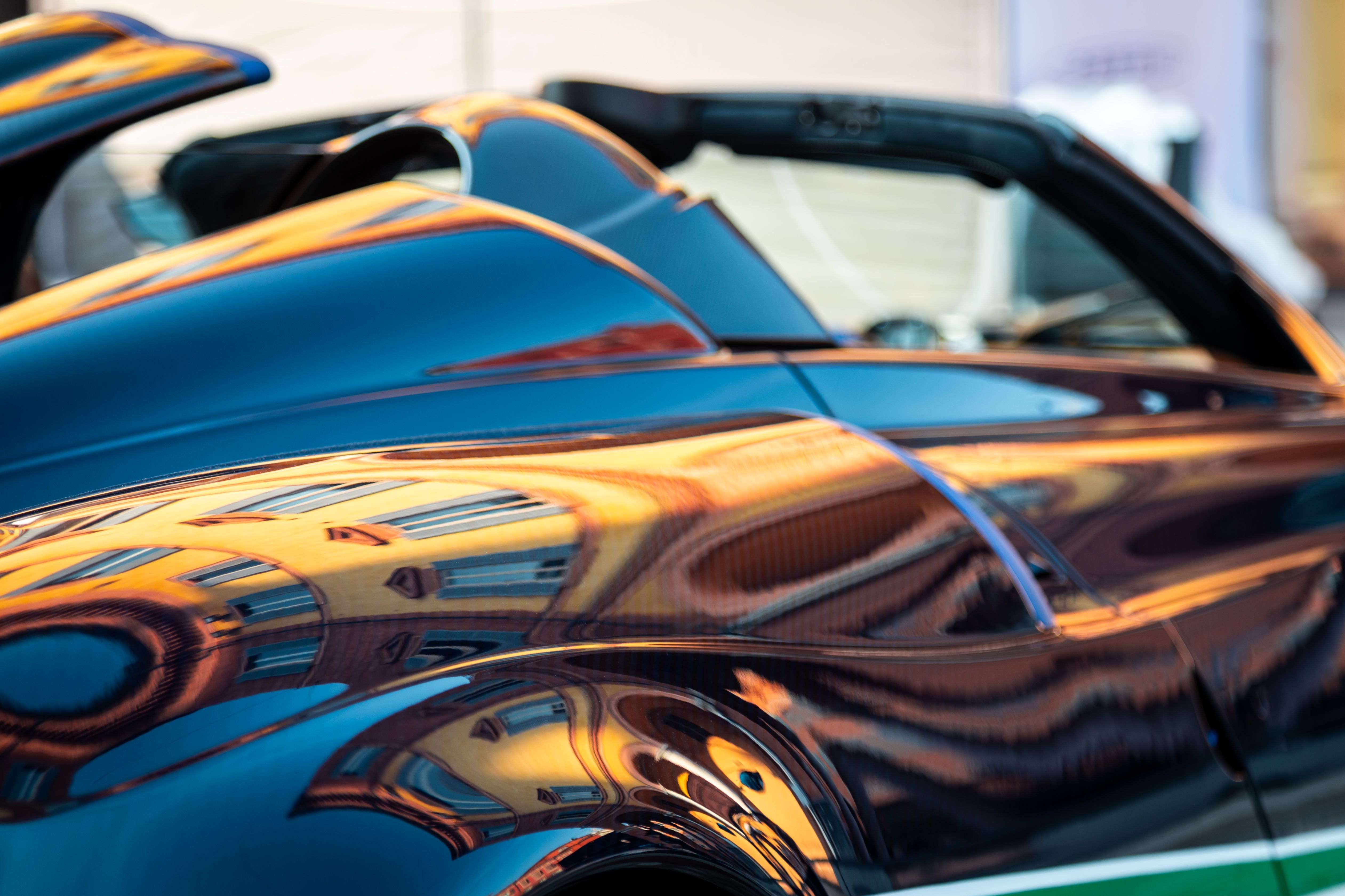 Close-Up of Reflective Supercar Surface · Free Stock Photo
