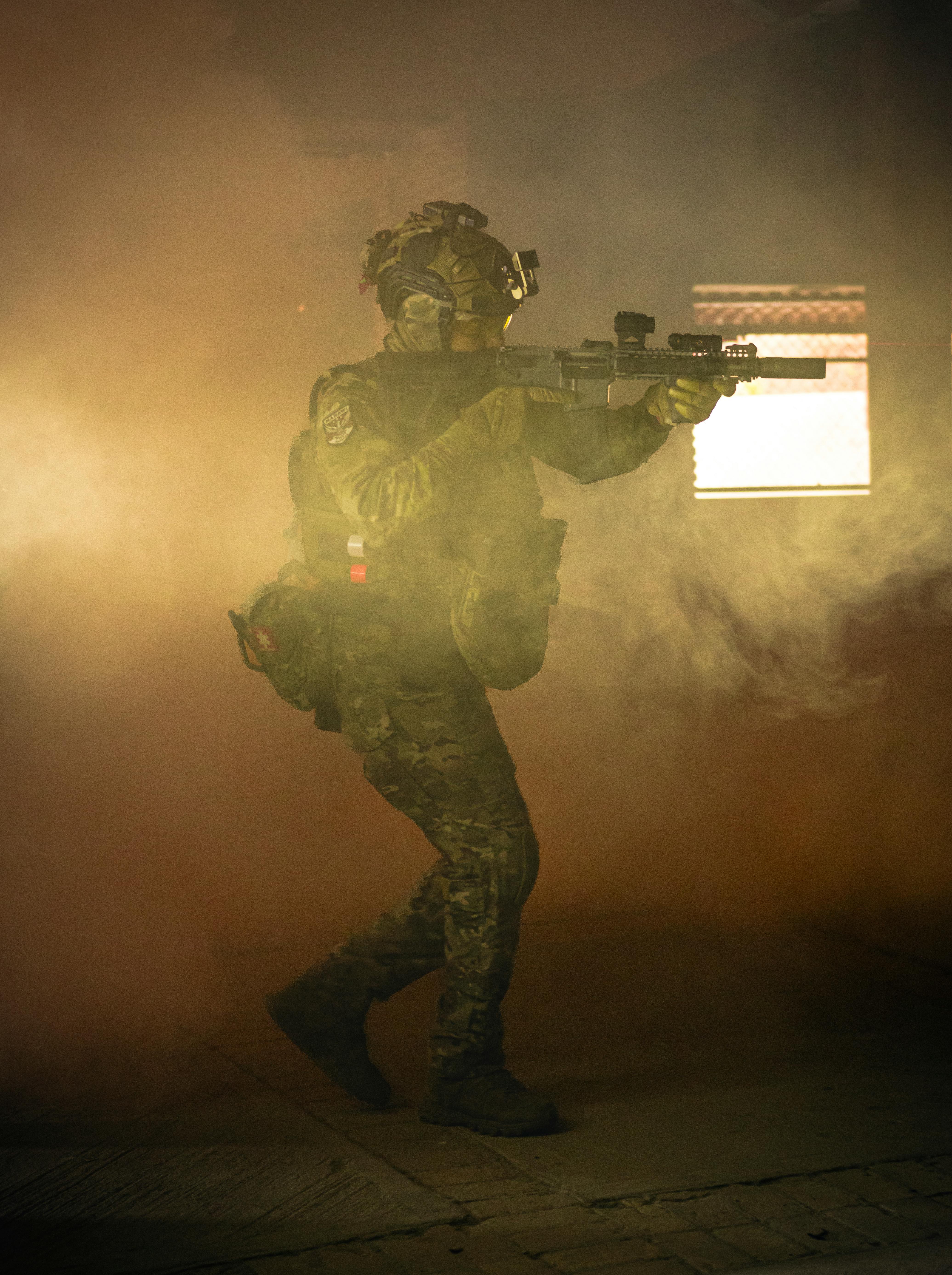 Tactical Soldier in Smoky Urban Environment · Free Stock Photo