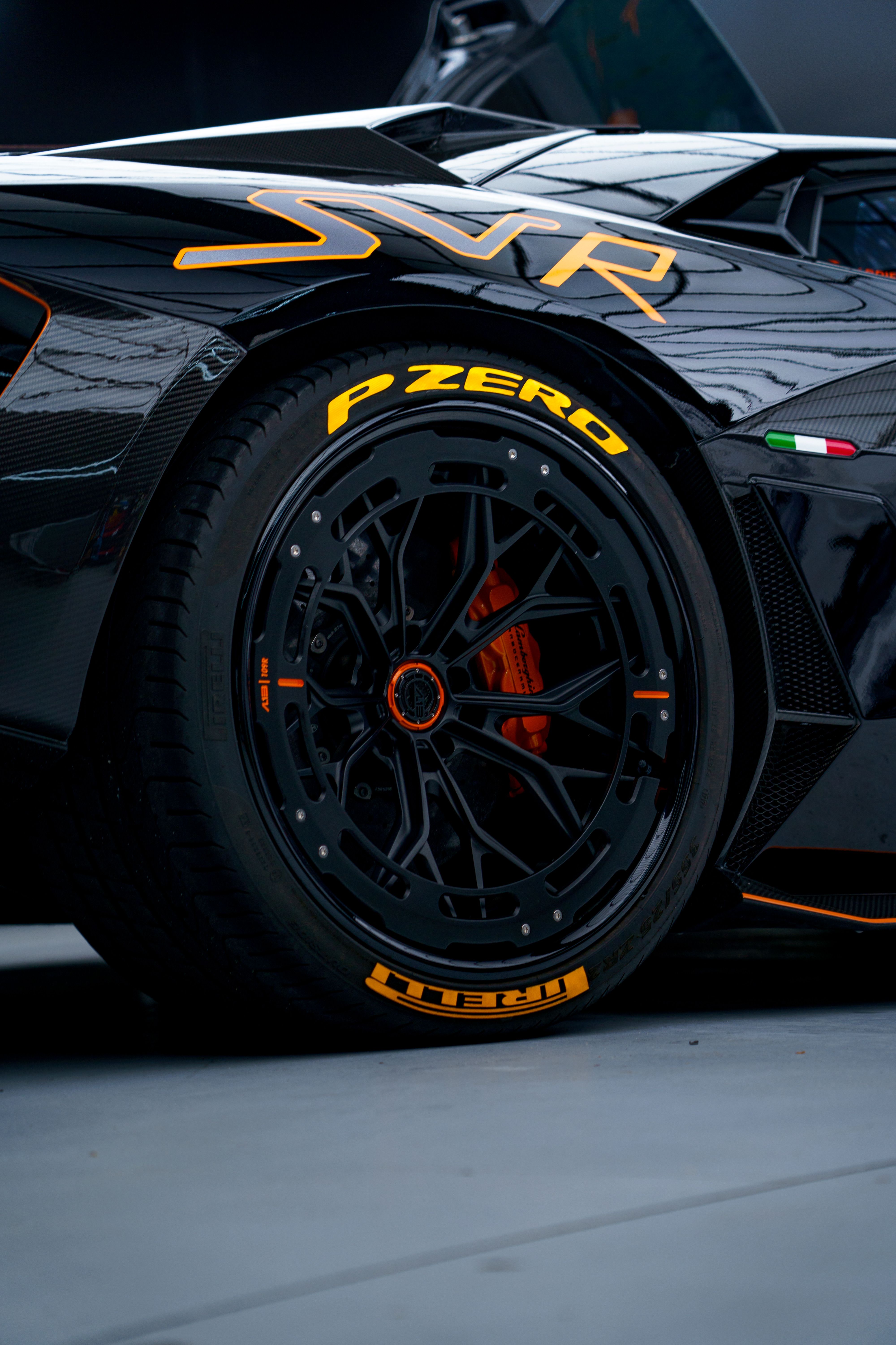Luxury Sports Car Wheel Close-Up with Pirelli Tire · Free Stock Photo