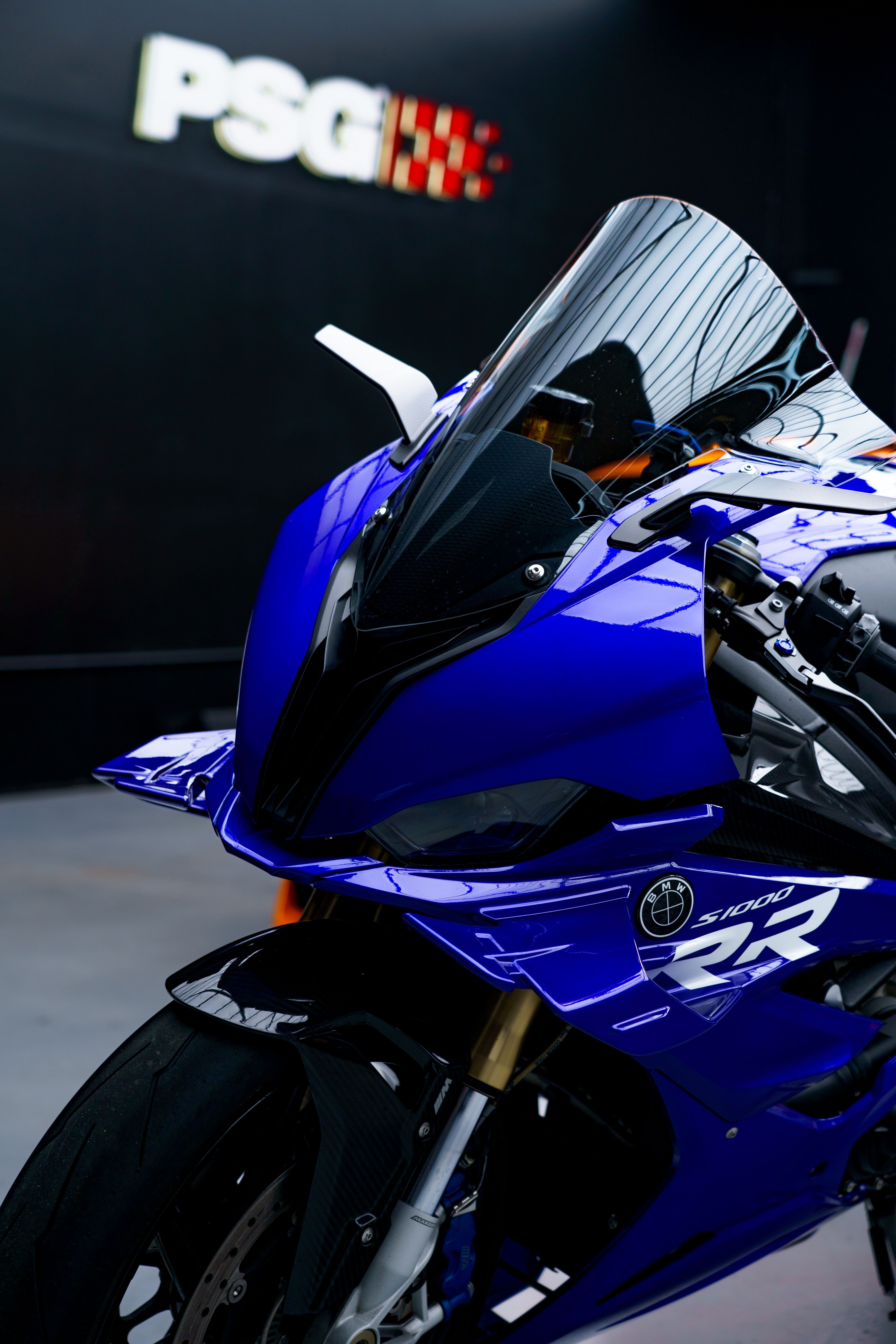 Sleek Blue Modern Motorcycle Indoors · Free Stock Photo