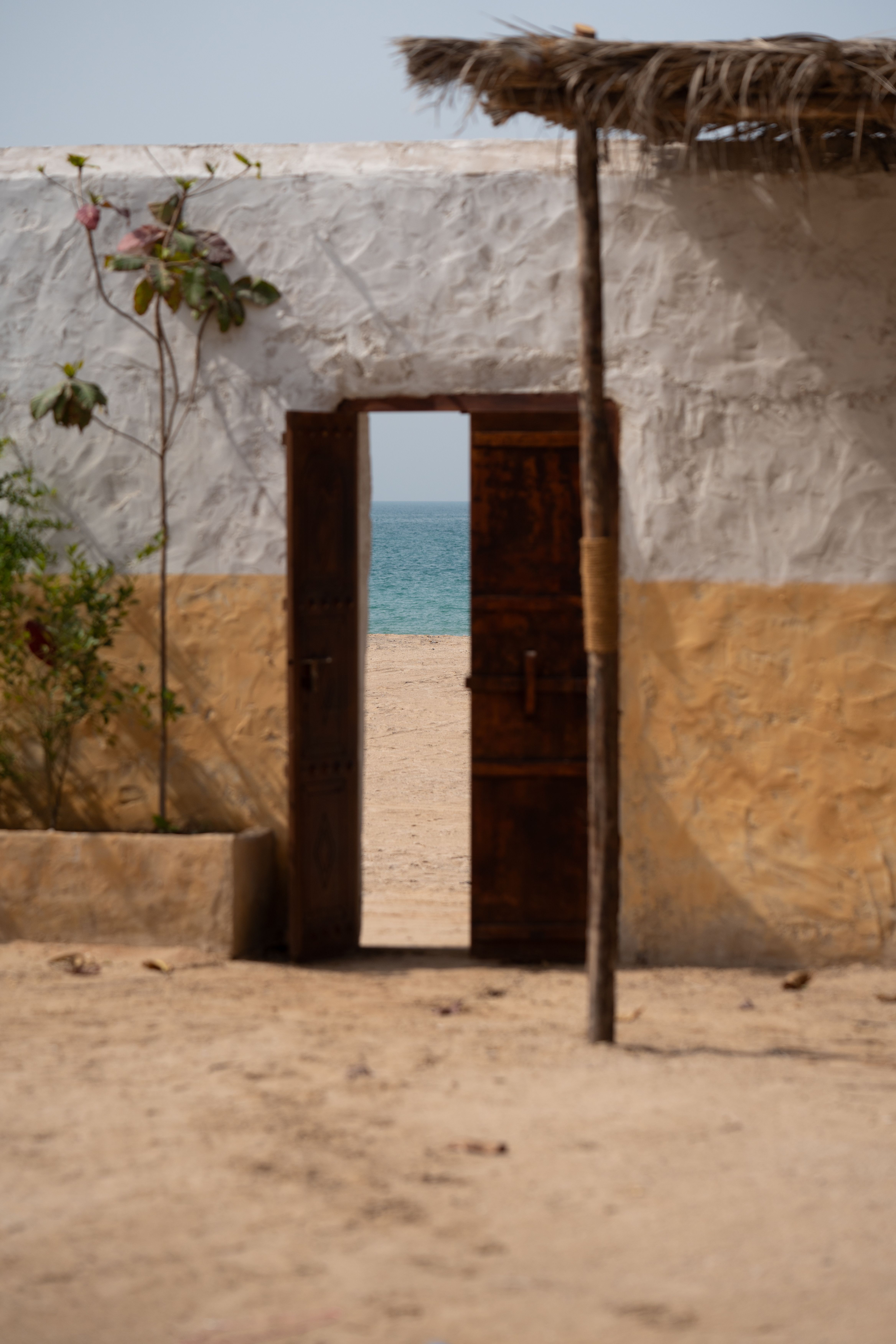 Rustic Beach Doorway with Ocean View · Free Stock Photo