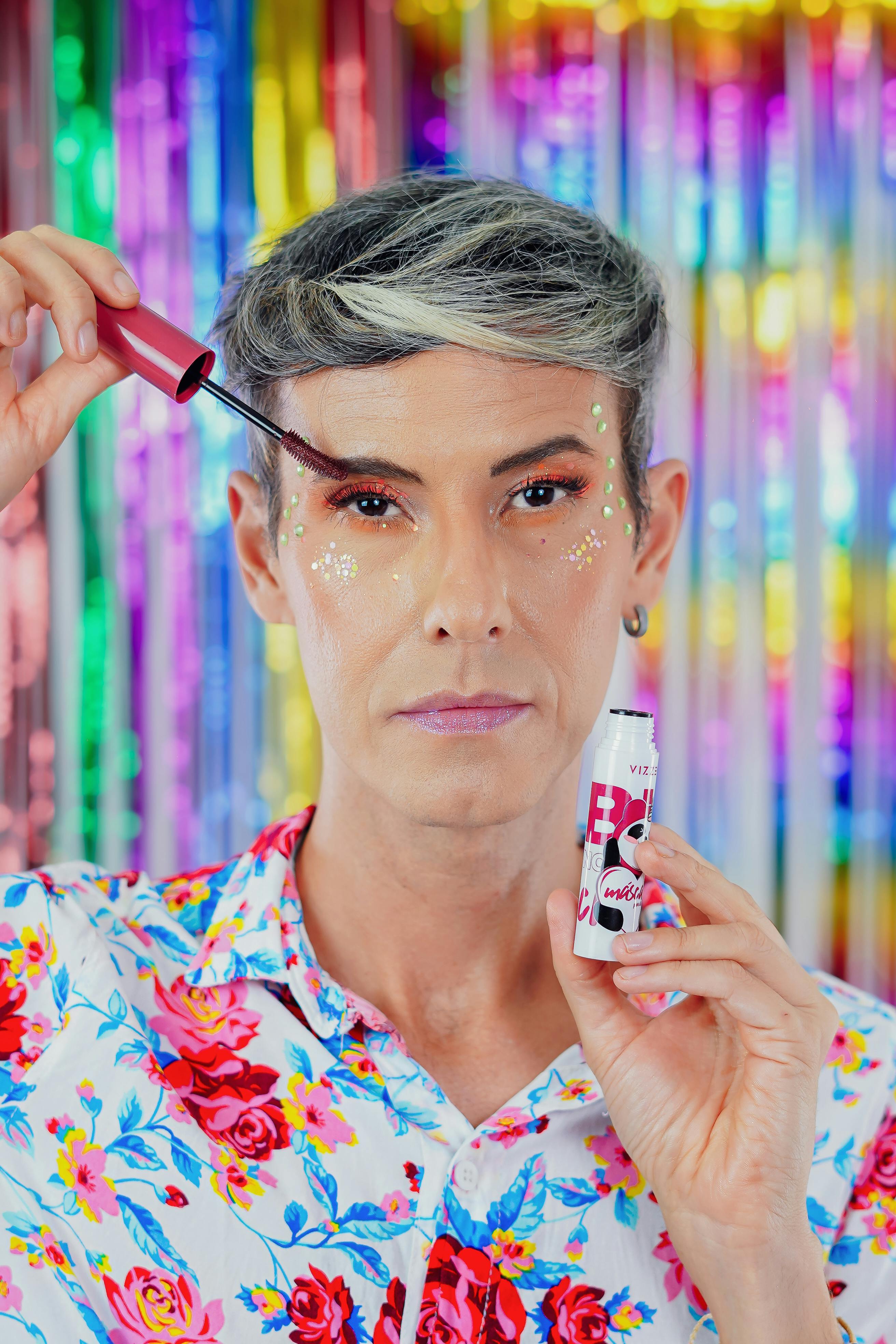 Colorful Makeup Expression in Vibrant Setting · Free Stock Photo