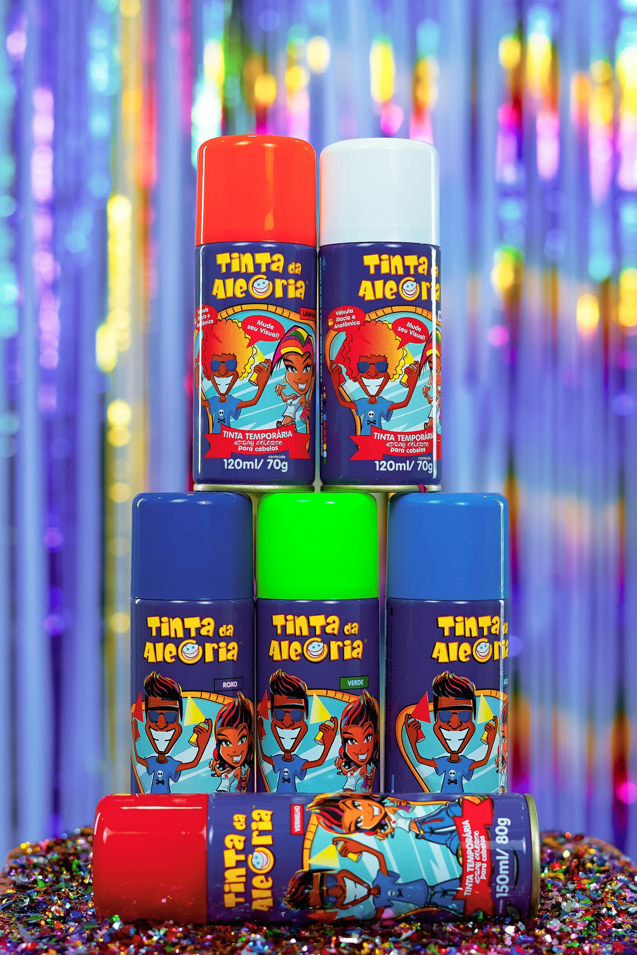 Colorful Spray Paint Cans on Vibrant Background · Free Stock Photo