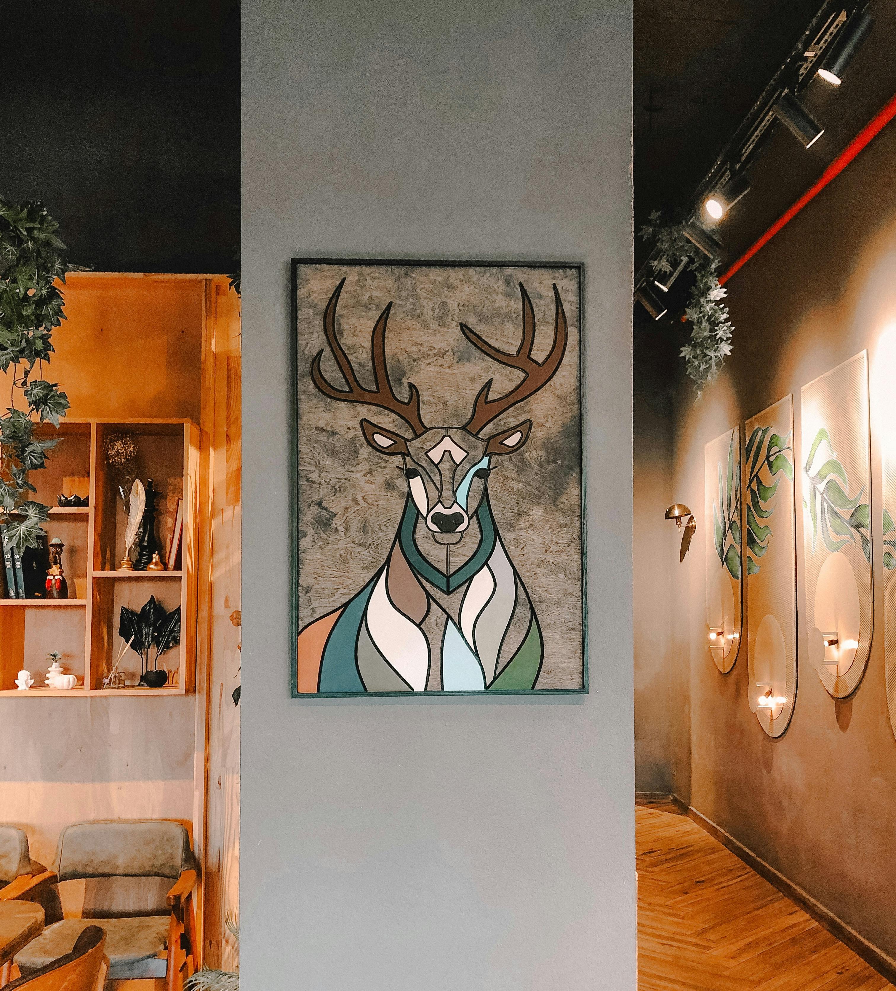 Modern Deer Artwork in Cozy Living Space · Free Stock Photo