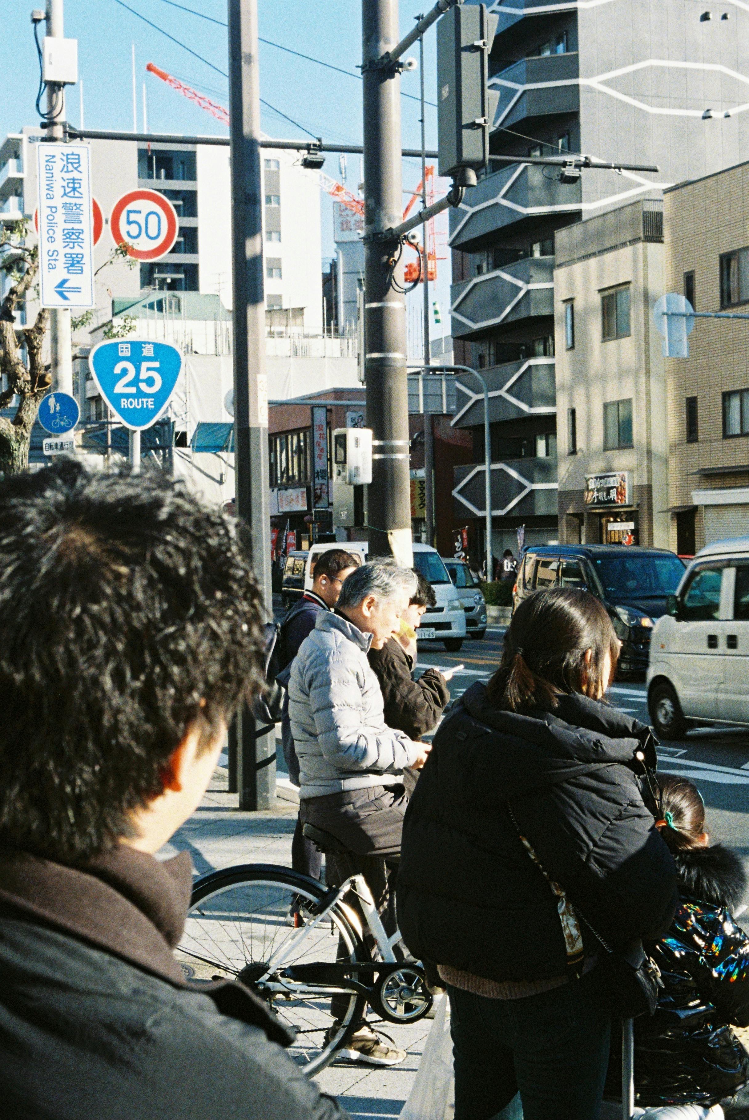 Busy Osaka Street Scene Captured in Daylight · Free Stock Photo