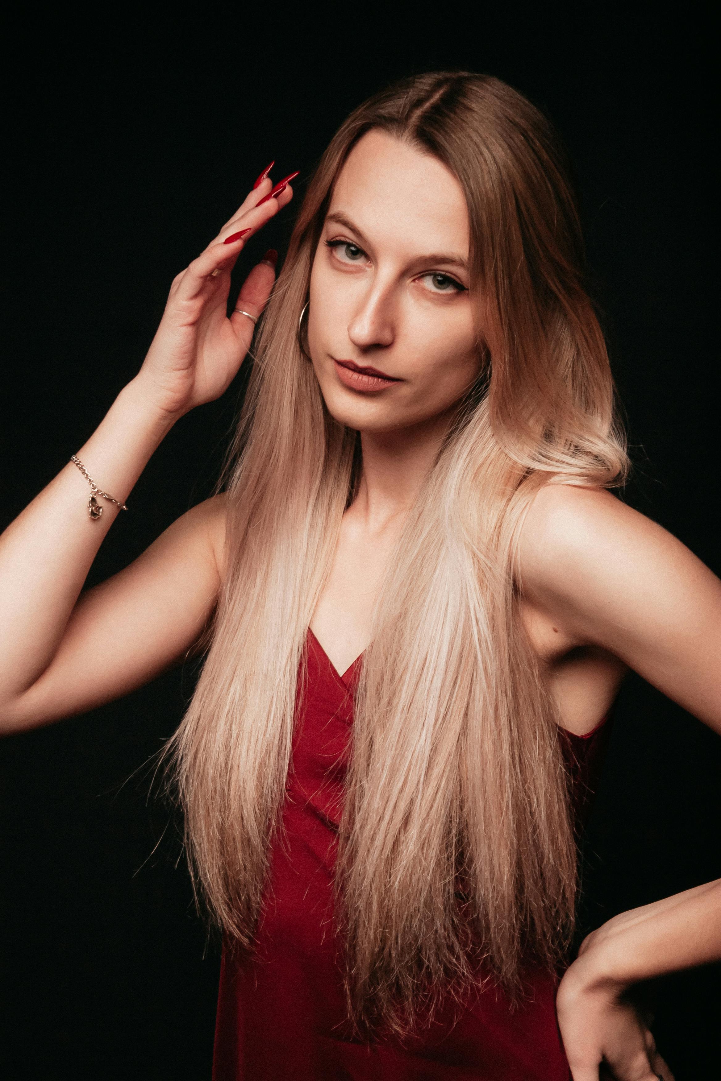 Elegant Portrait of Female Model in Red Dress · Free Stock Photo