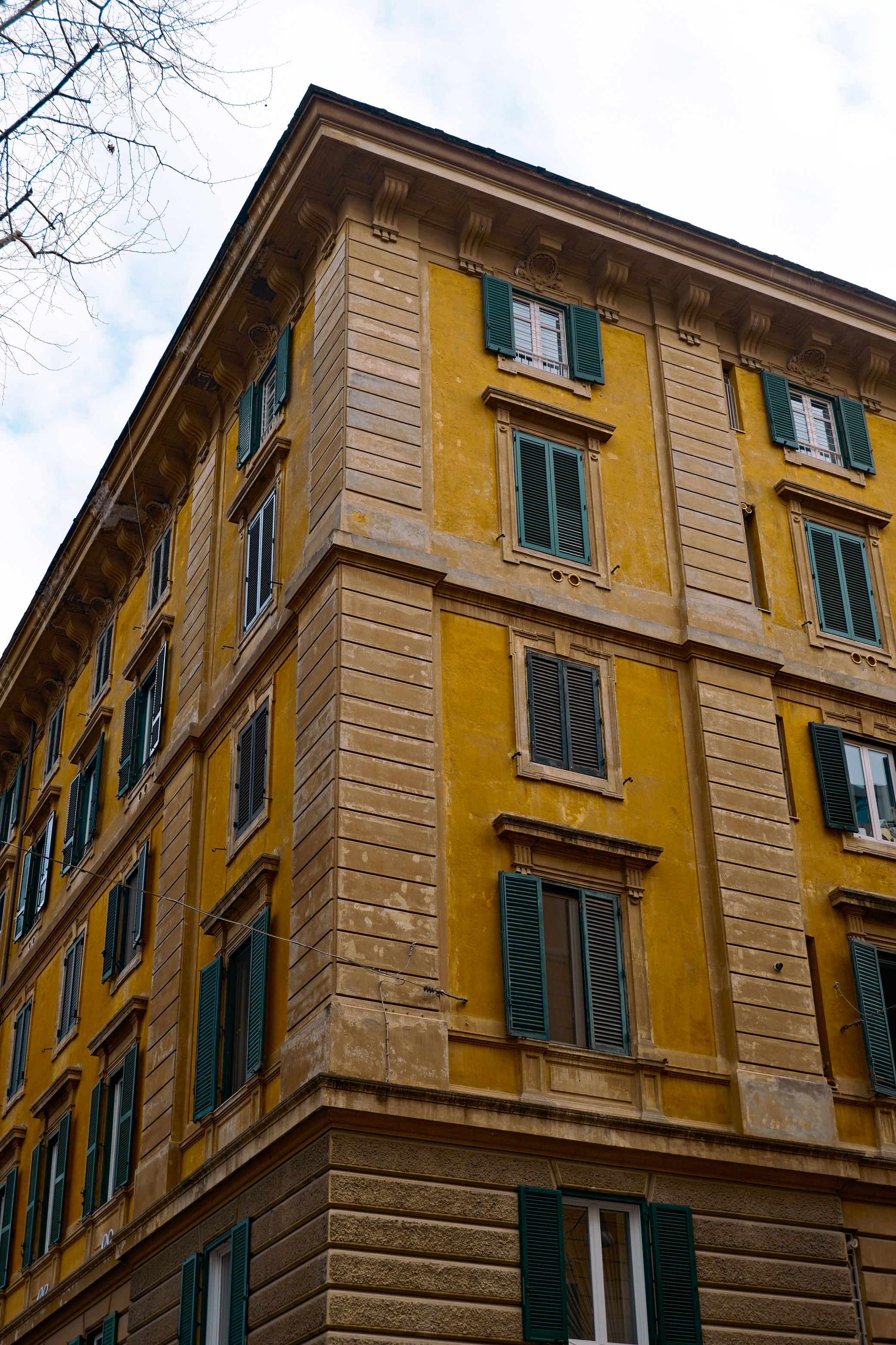Historic Roman Building with Vibrant Yellow Facade · Free Stock Photo