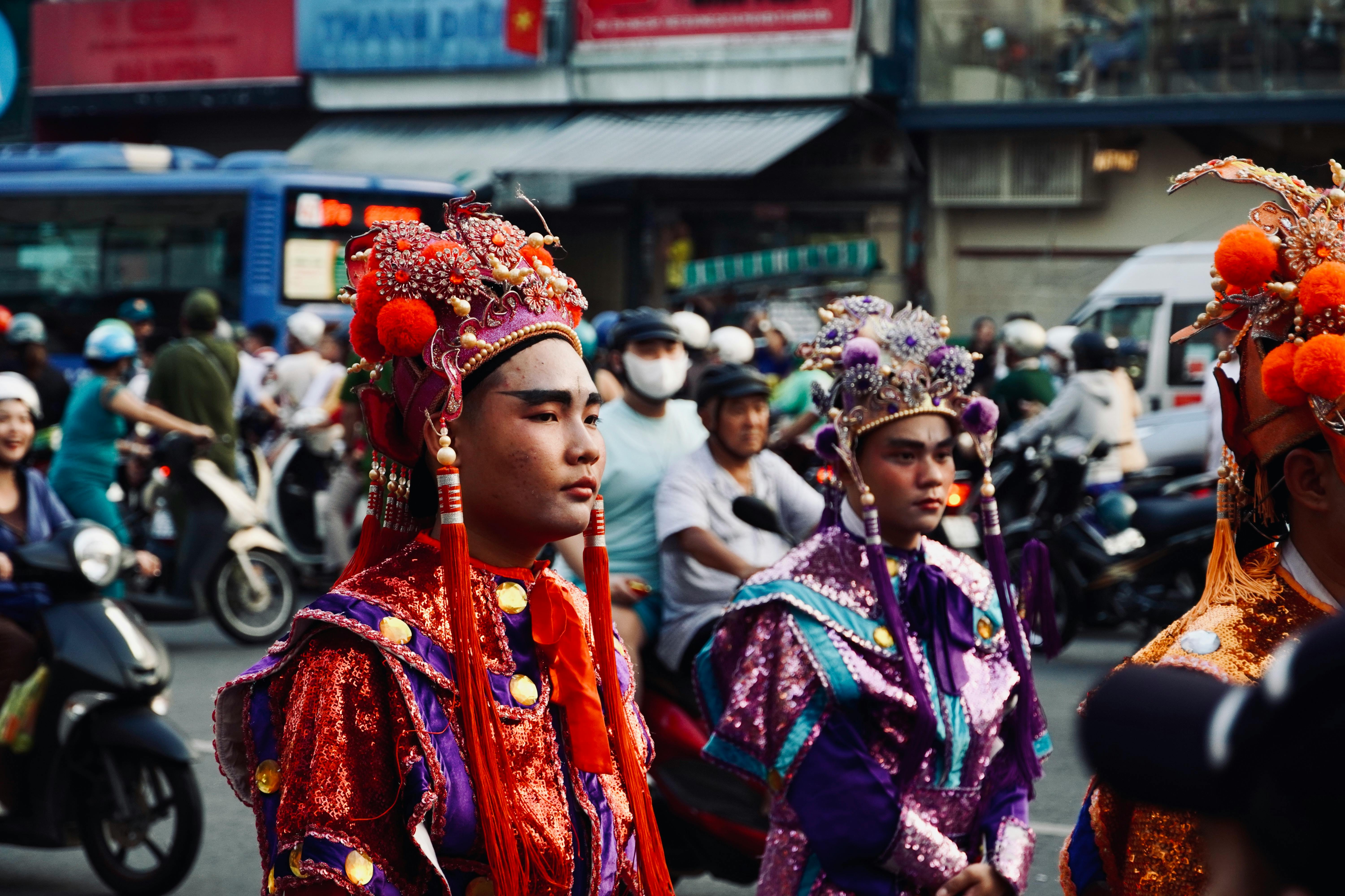 Colorful Traditional Parade in Busy Urban Street · Free Stock Photo