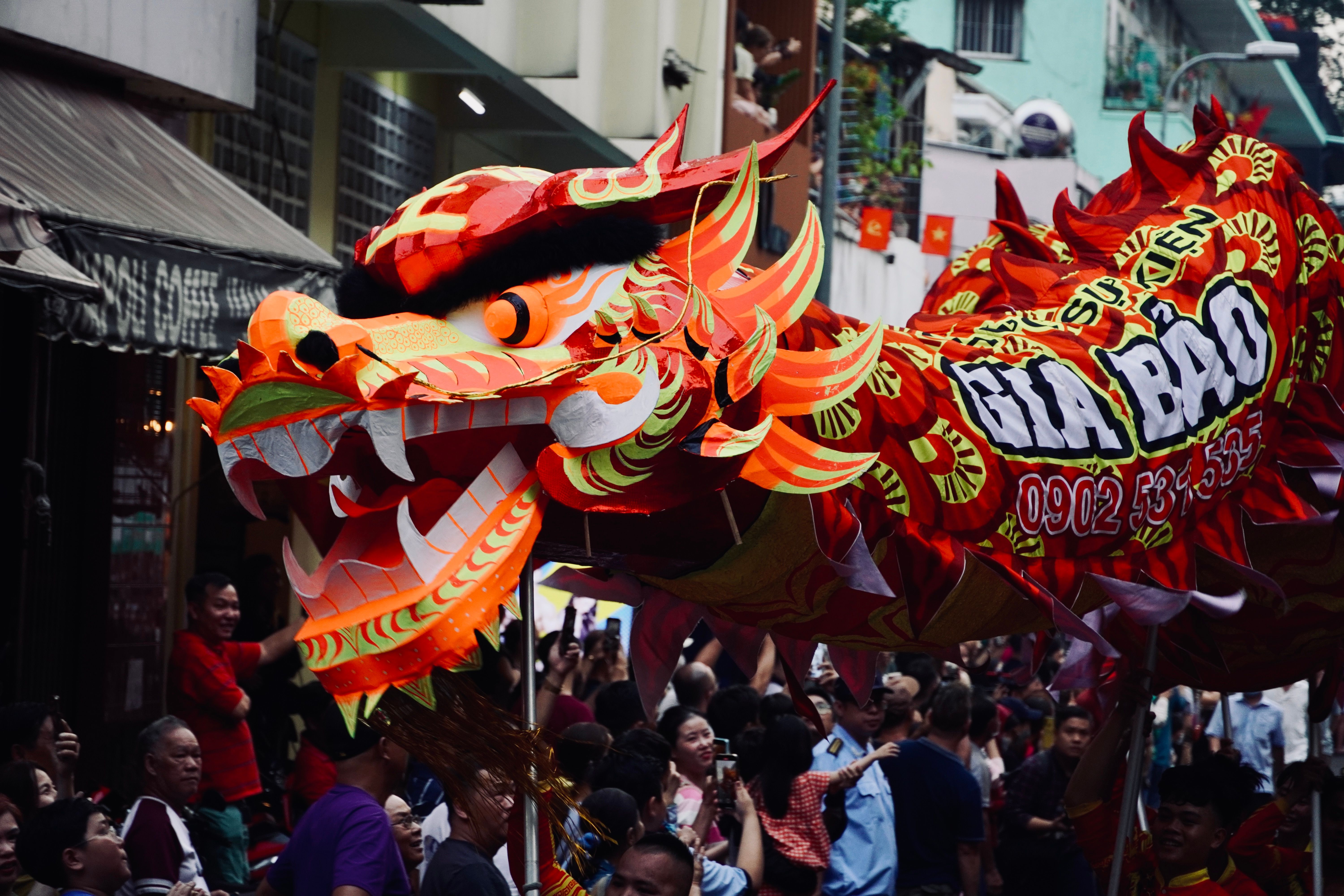 Vibrant Traditional Dragon Parade Celebration · Free Stock Photo