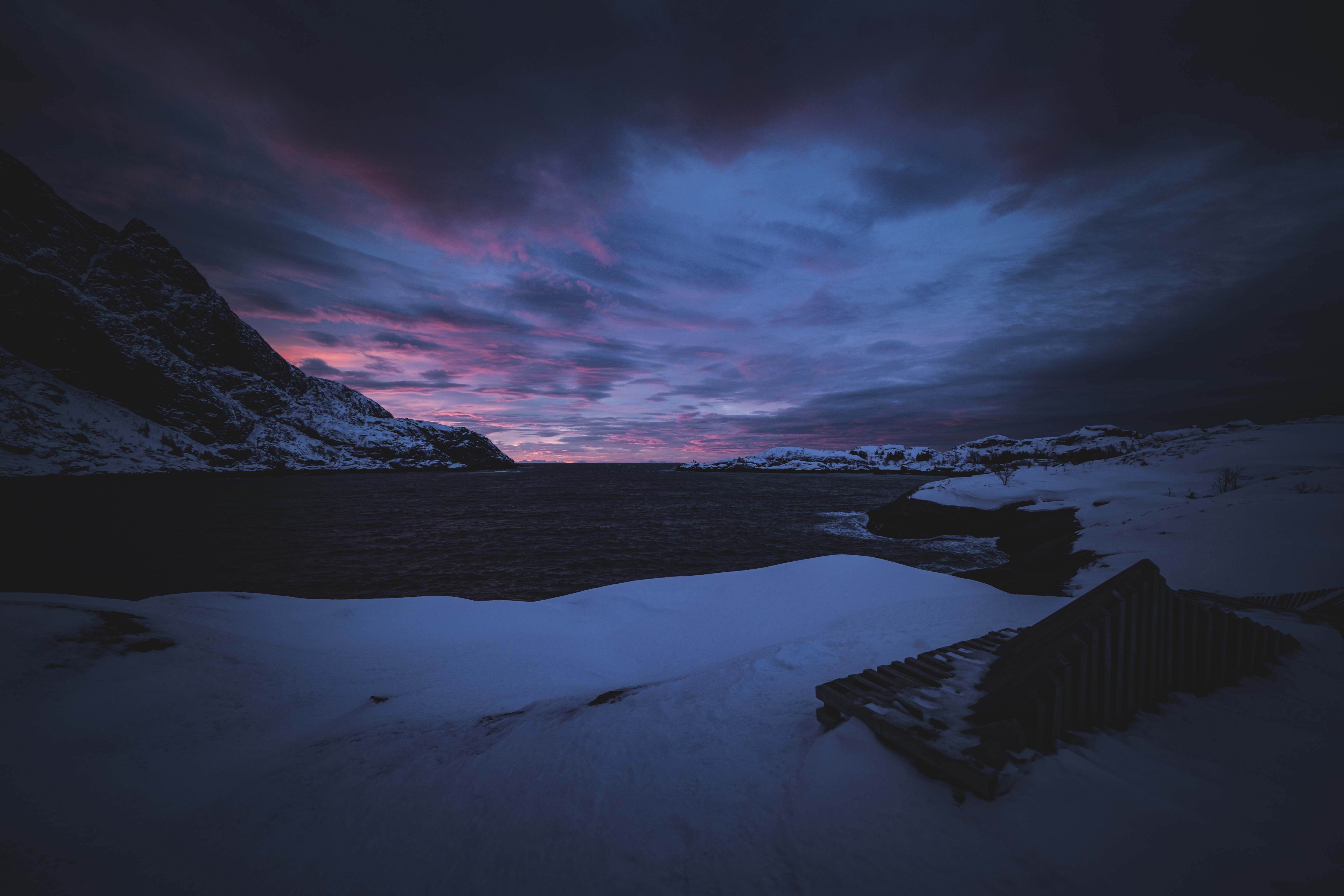 Serene Winter Twilight Over Snowy Landscape · Free Stock Photo