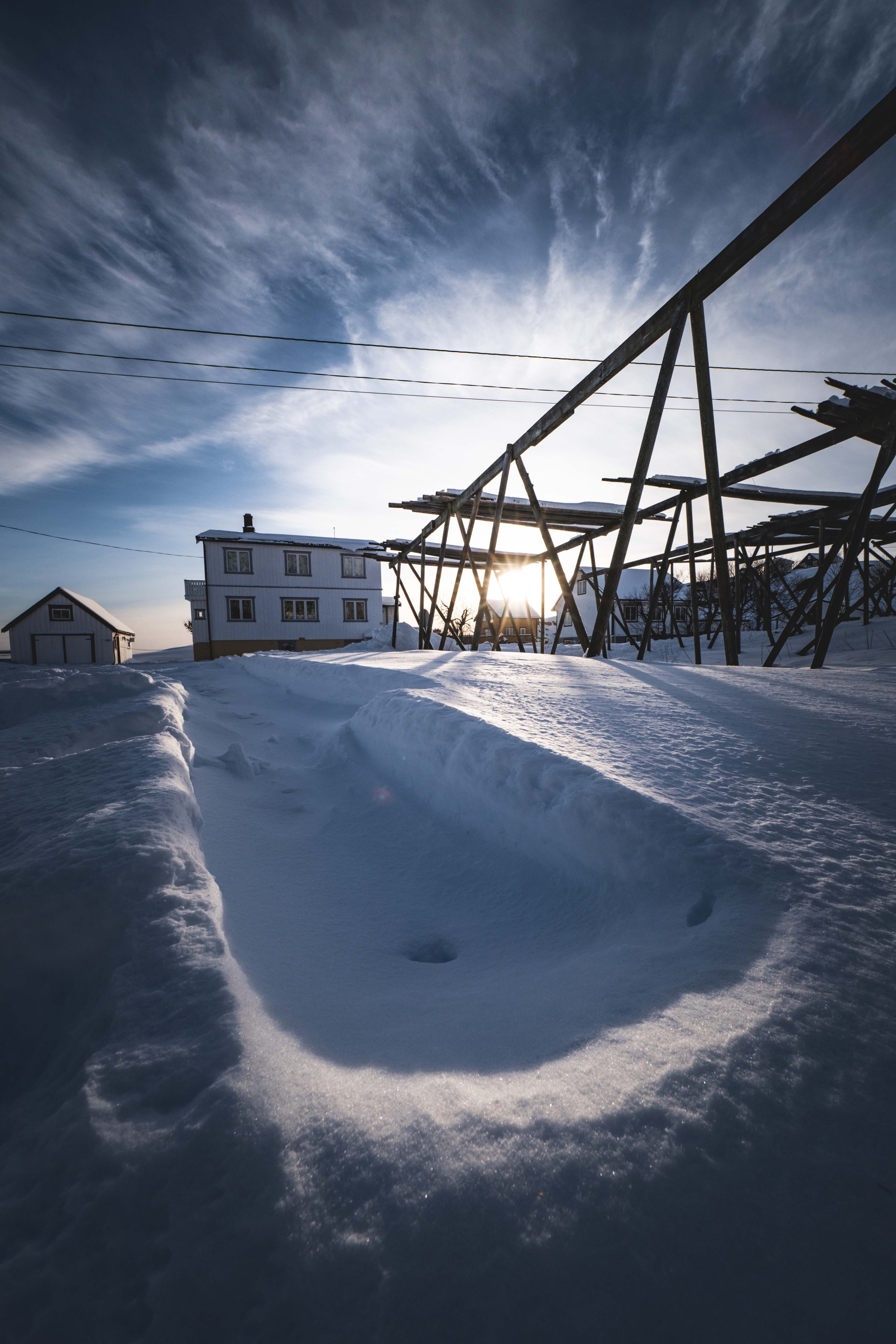 Winter Landscape with Snow and Wooden Structures · Free Stock Photo
