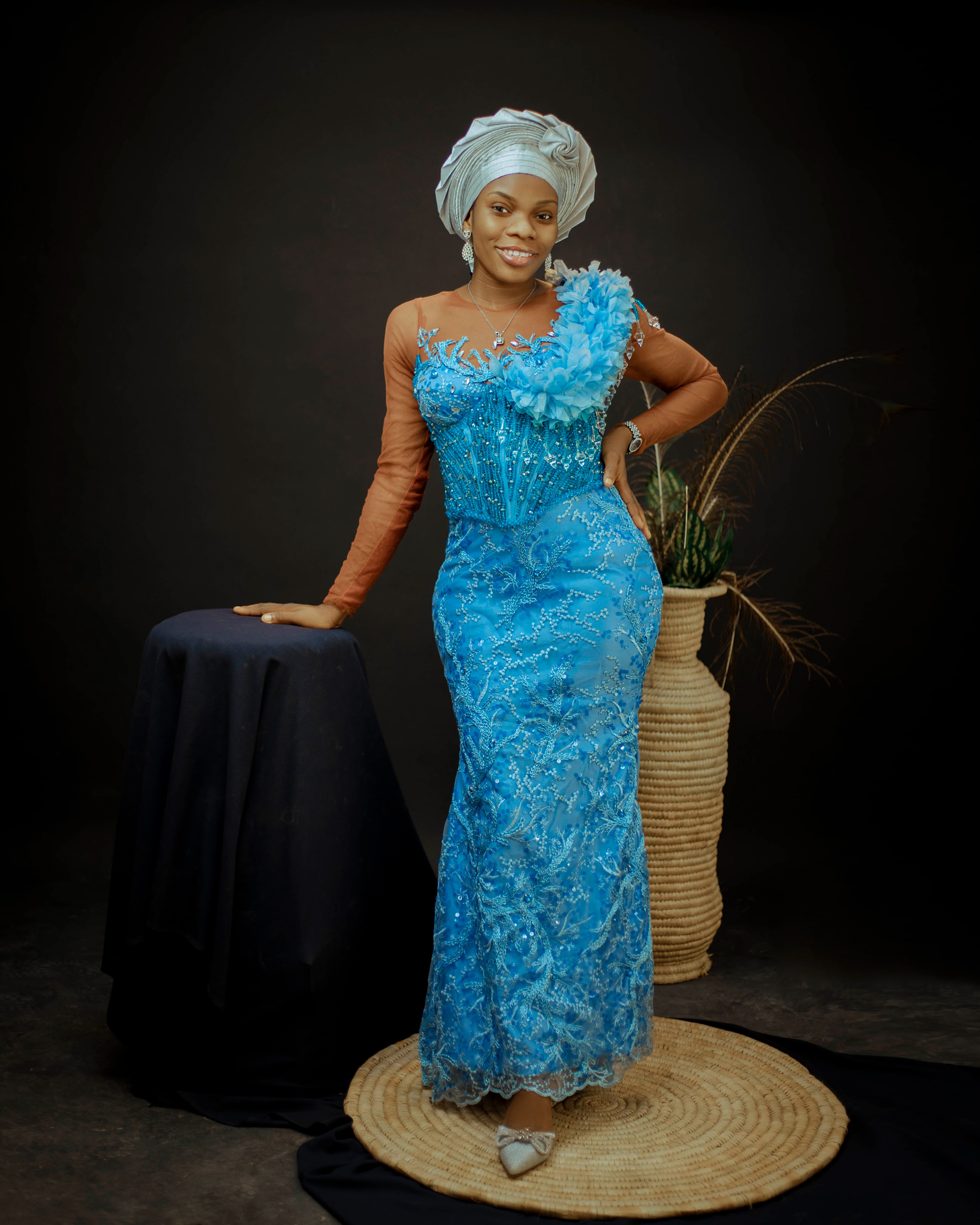 Elegant Woman in Traditional Blue Attire · Free Stock Photo
