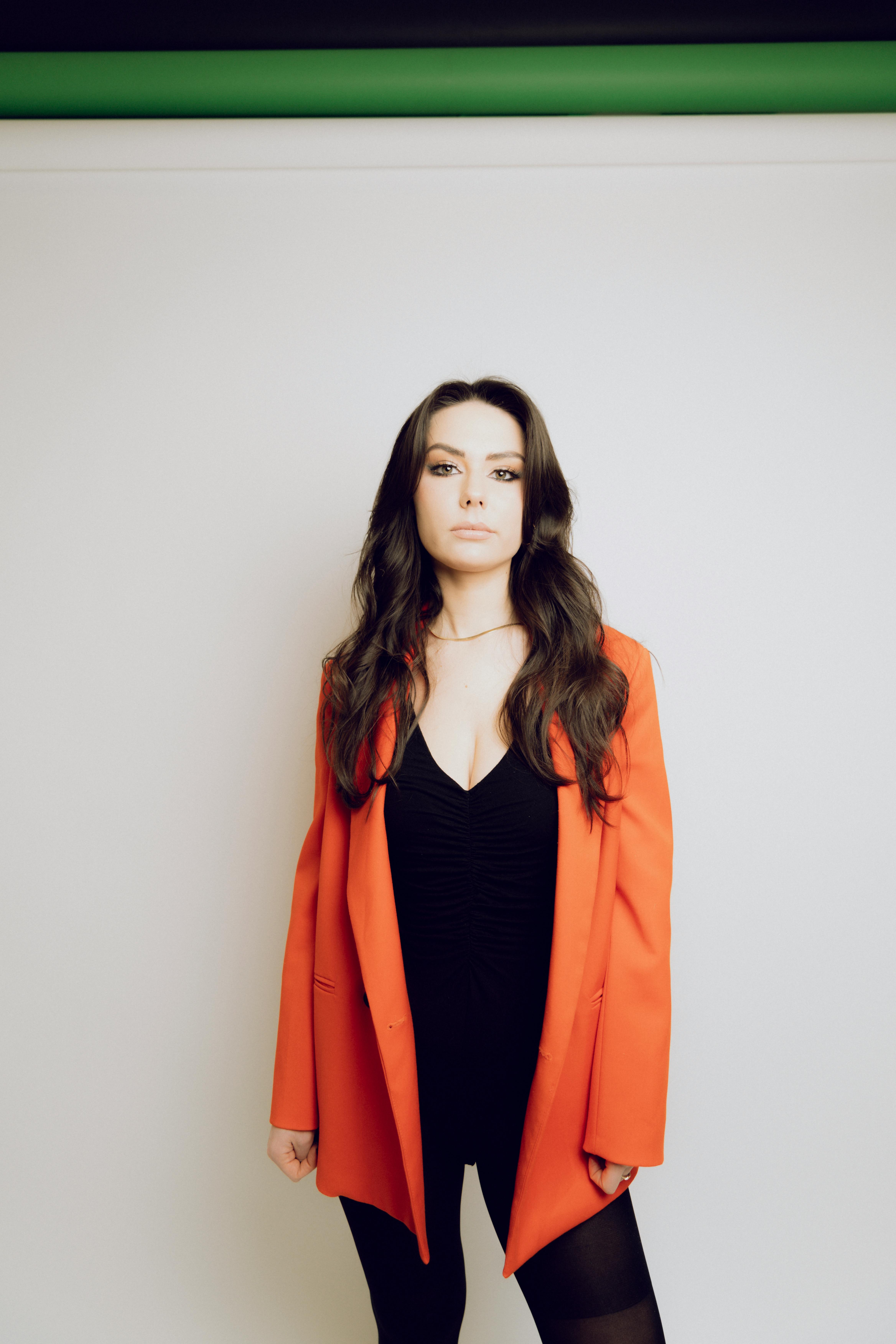 Stylish Woman in Red Jacket Portrait · Free Stock Photo