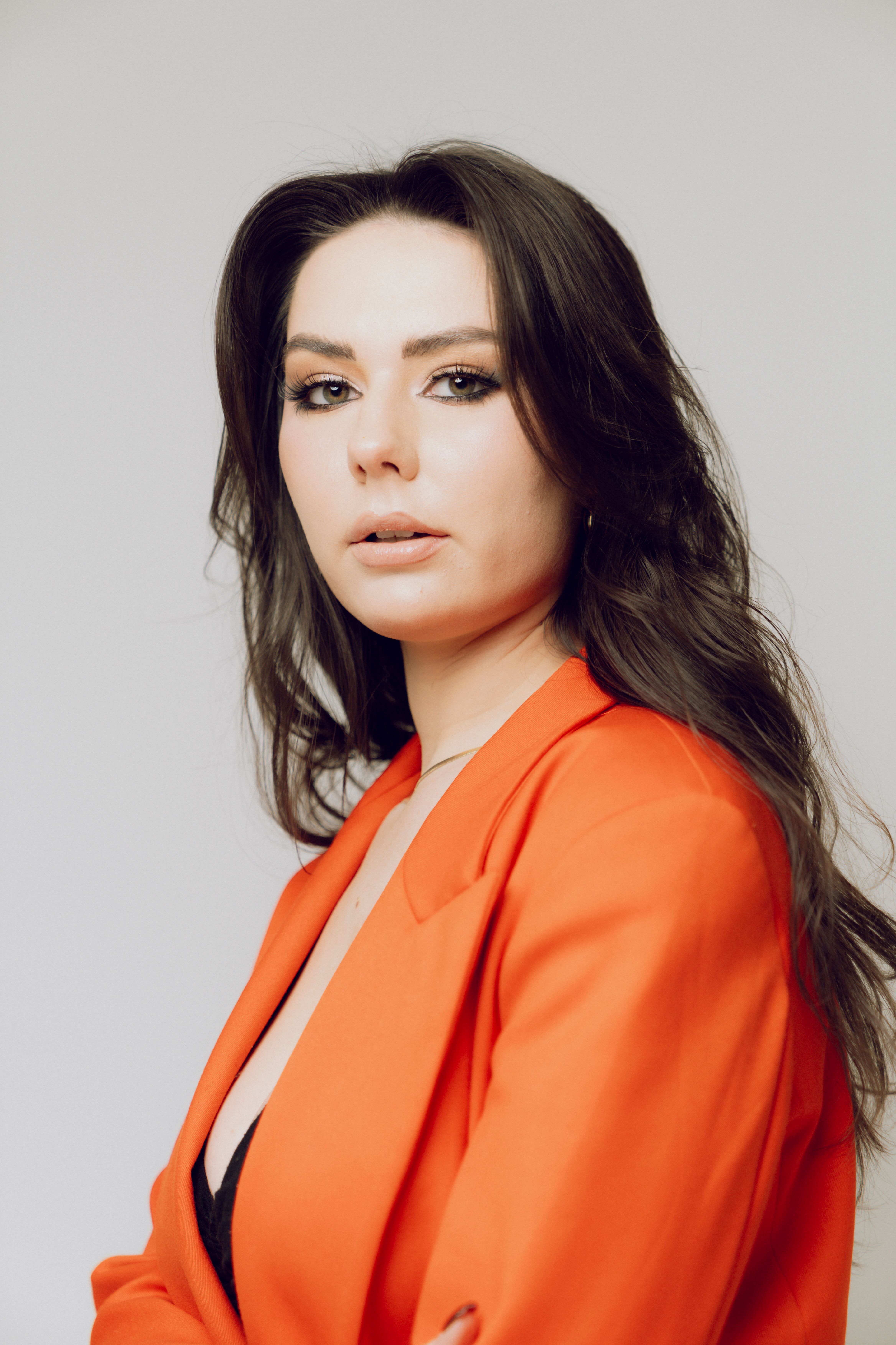 Elegant Portrait of a Woman in Red Jacket · Free Stock Photo