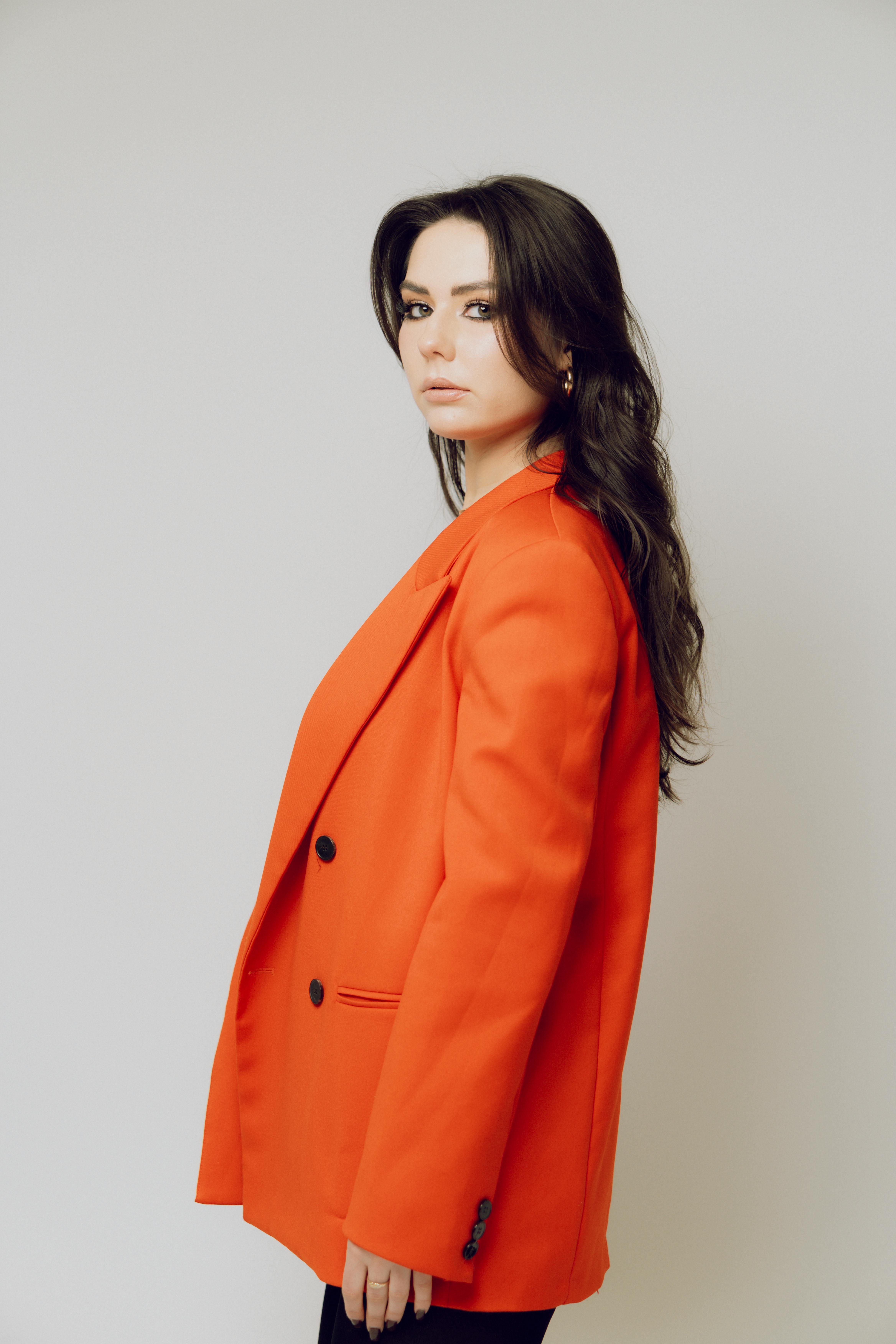 Elegant Woman in Red Jacket Portrait · Free Stock Photo