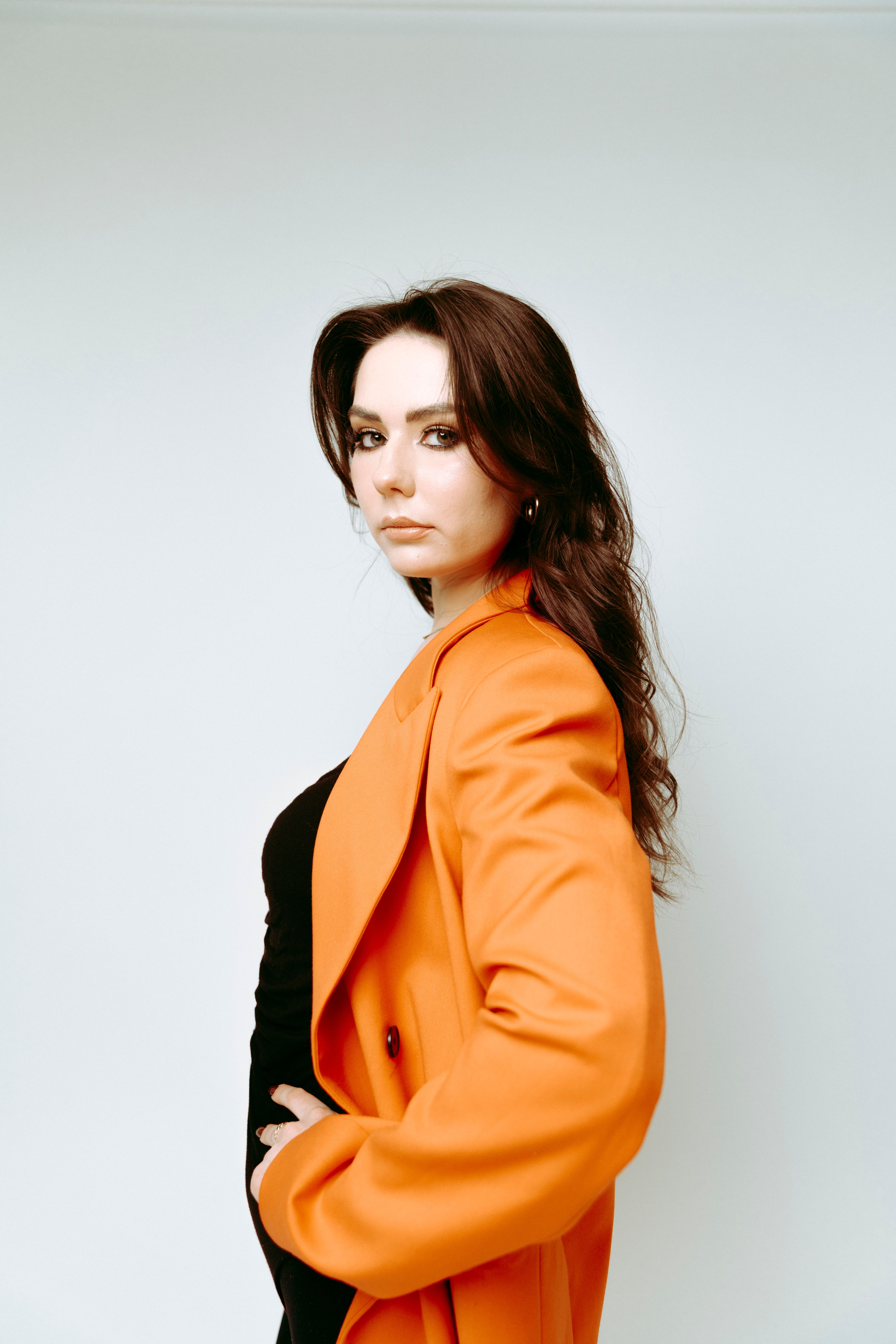 Fashionable Portrait of Woman in Orange Jacket · Free Stock Photo