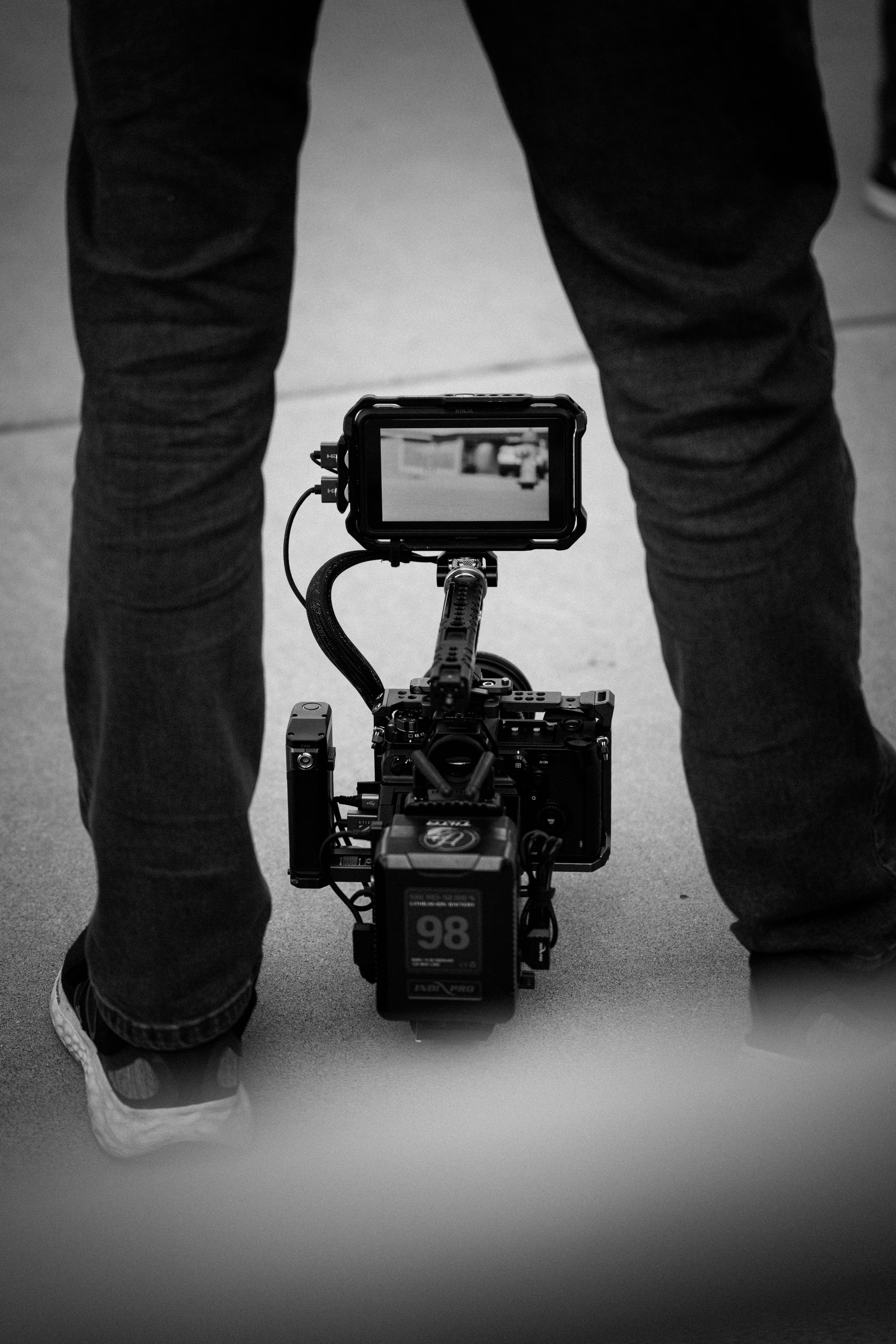 Black and White Cinematic Camera Setup Outdoors · Free Stock Photo