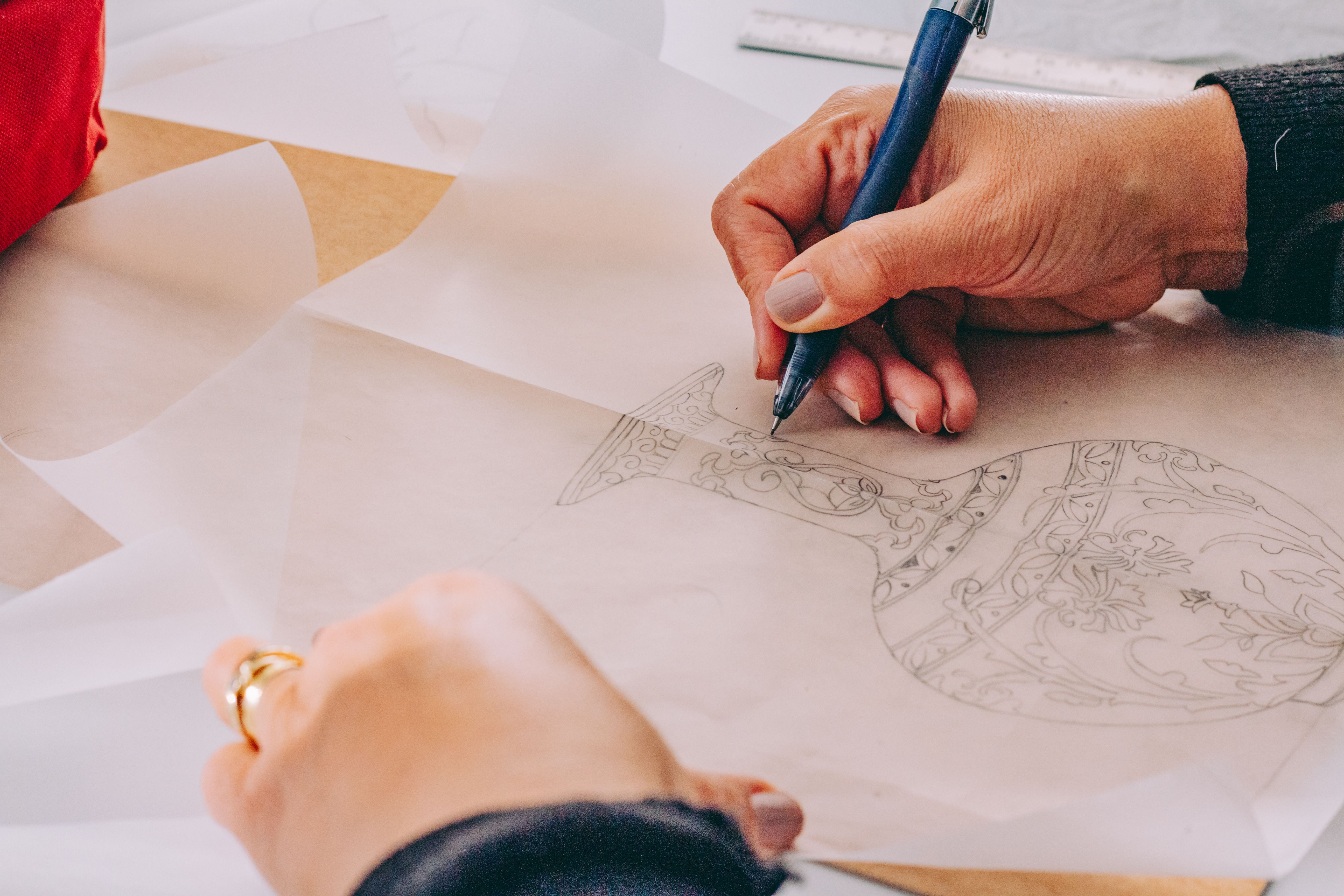 Crop person drawing sketch on paper · Free Stock Photo