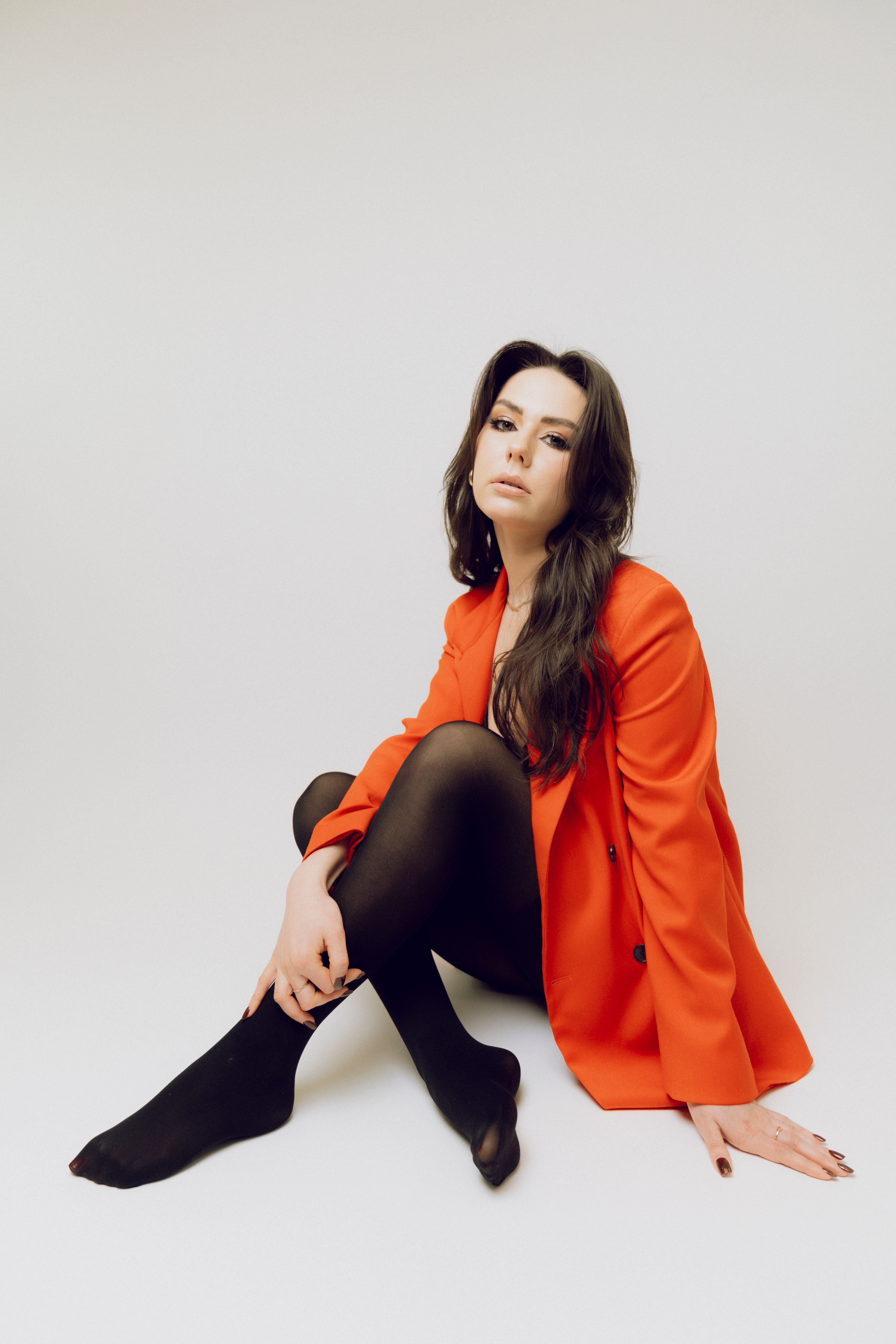 Stylish Woman in Red Jacket Studio Portrait · Free Stock Photo