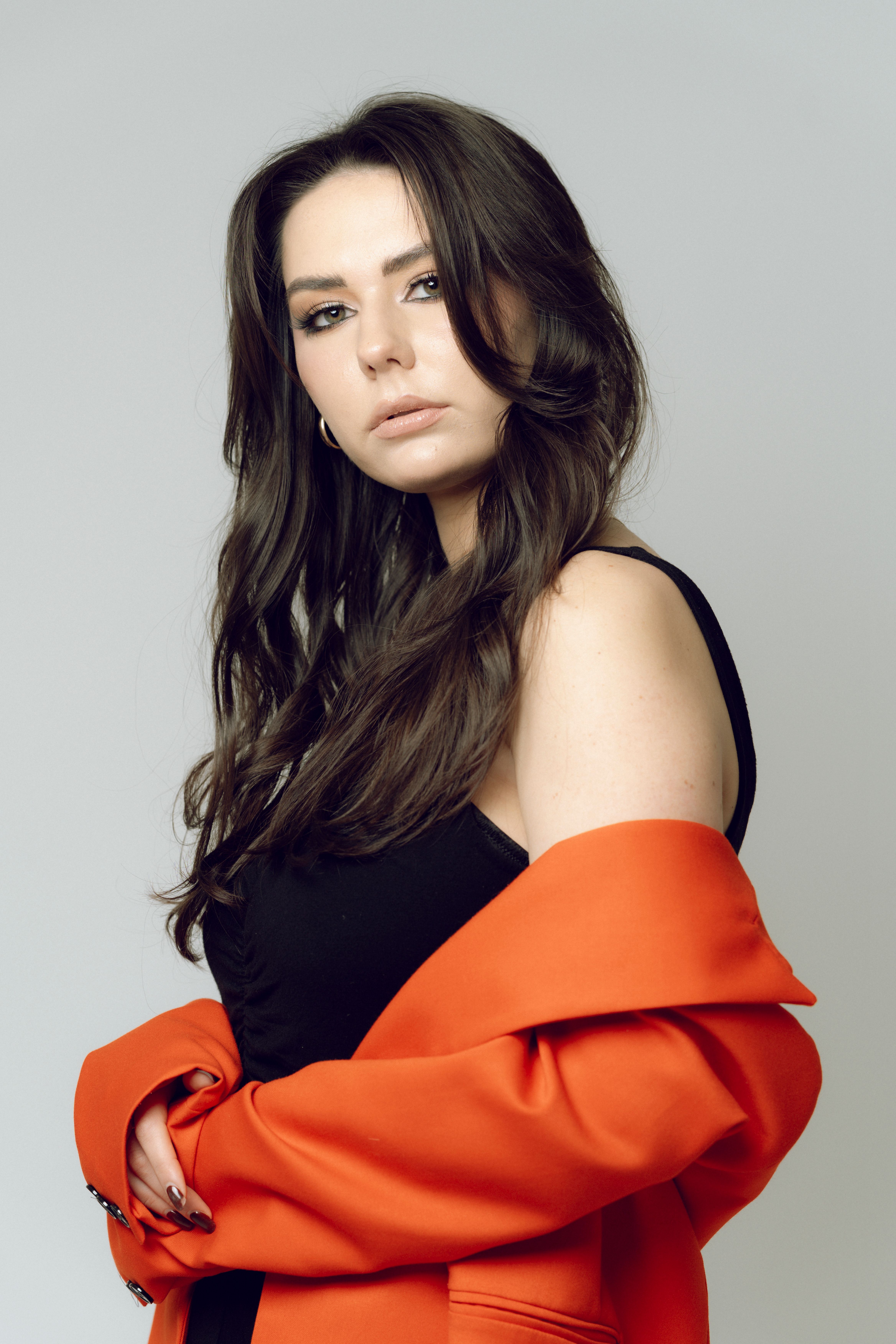 Elegant Portrait of a Woman in Red Jacket · Free Stock Photo