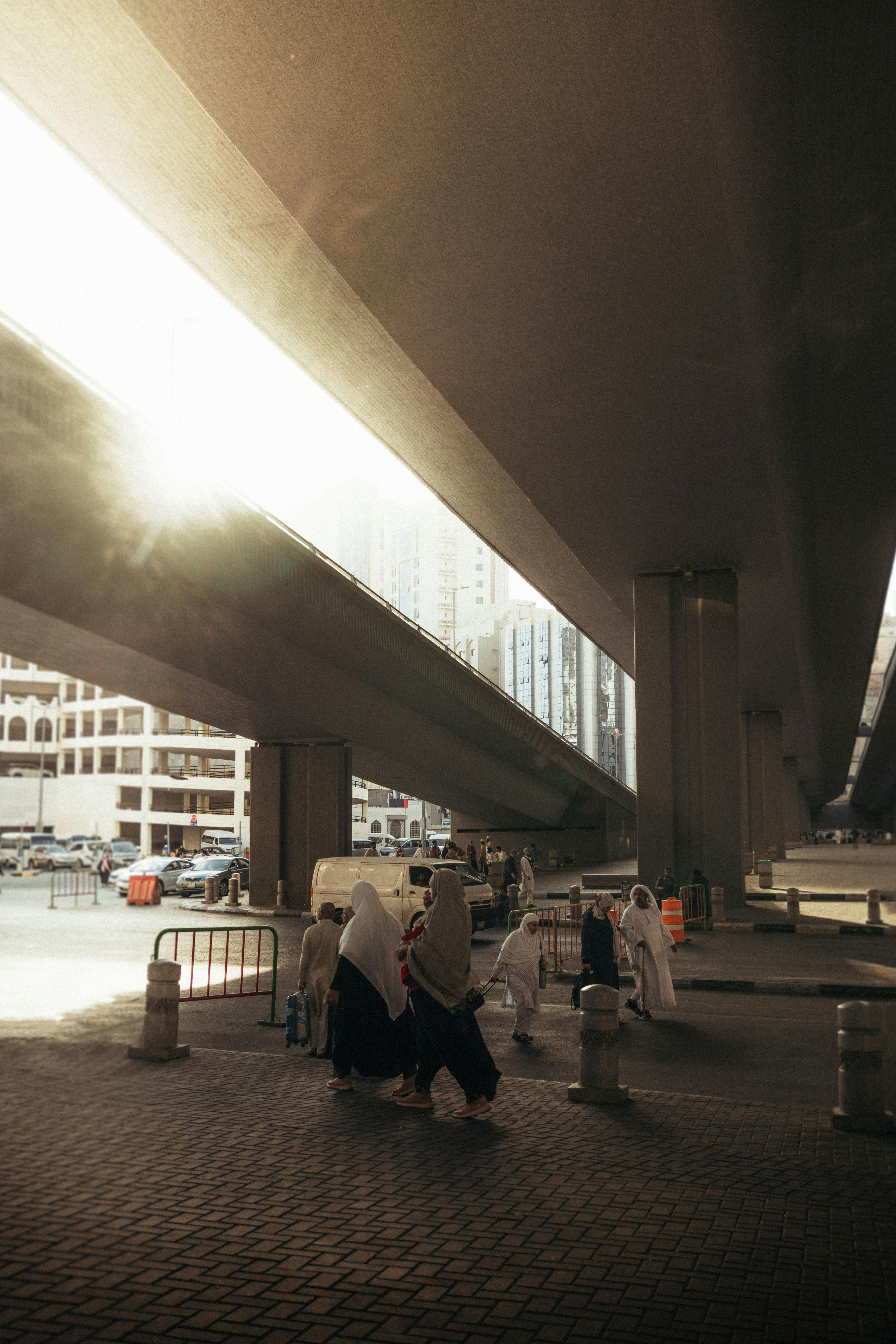 Urban Scene Under Highway Overpass at Sunrise · Free Stock Photo
