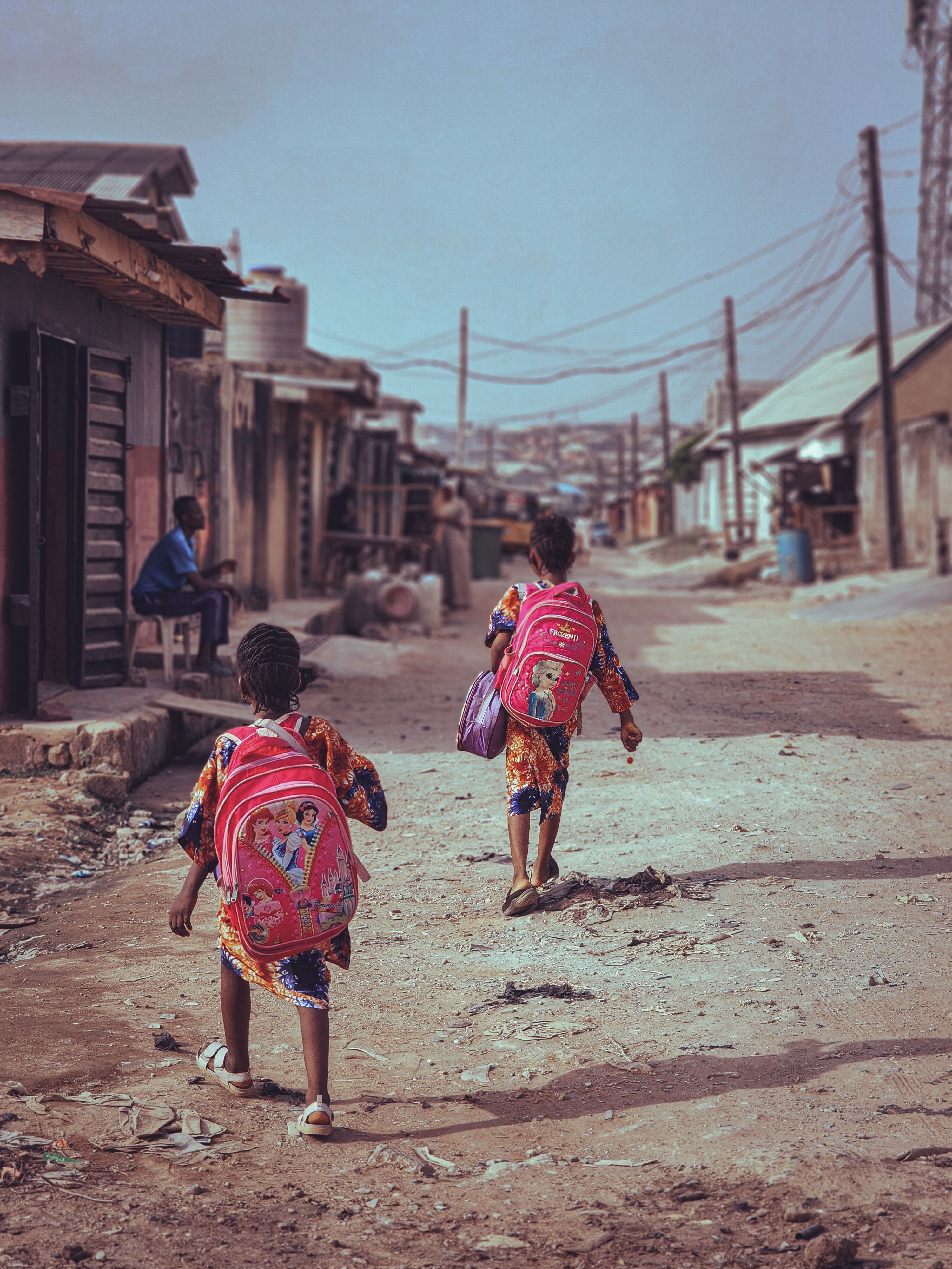 Children Walking Home on Rural Street · Free Stock Photo