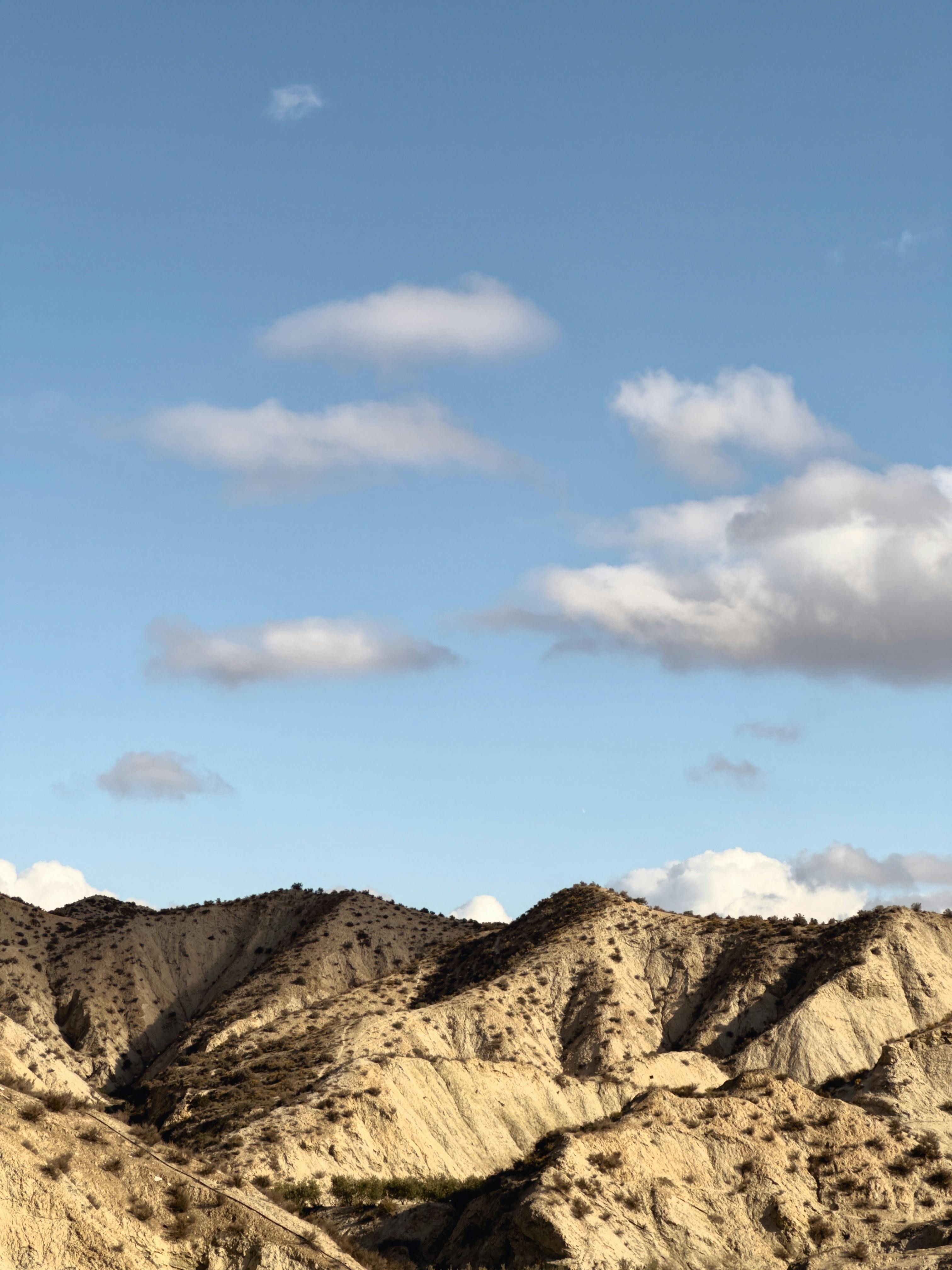 Remote Desert Landscape with Rolling Hills · Free Stock Photo