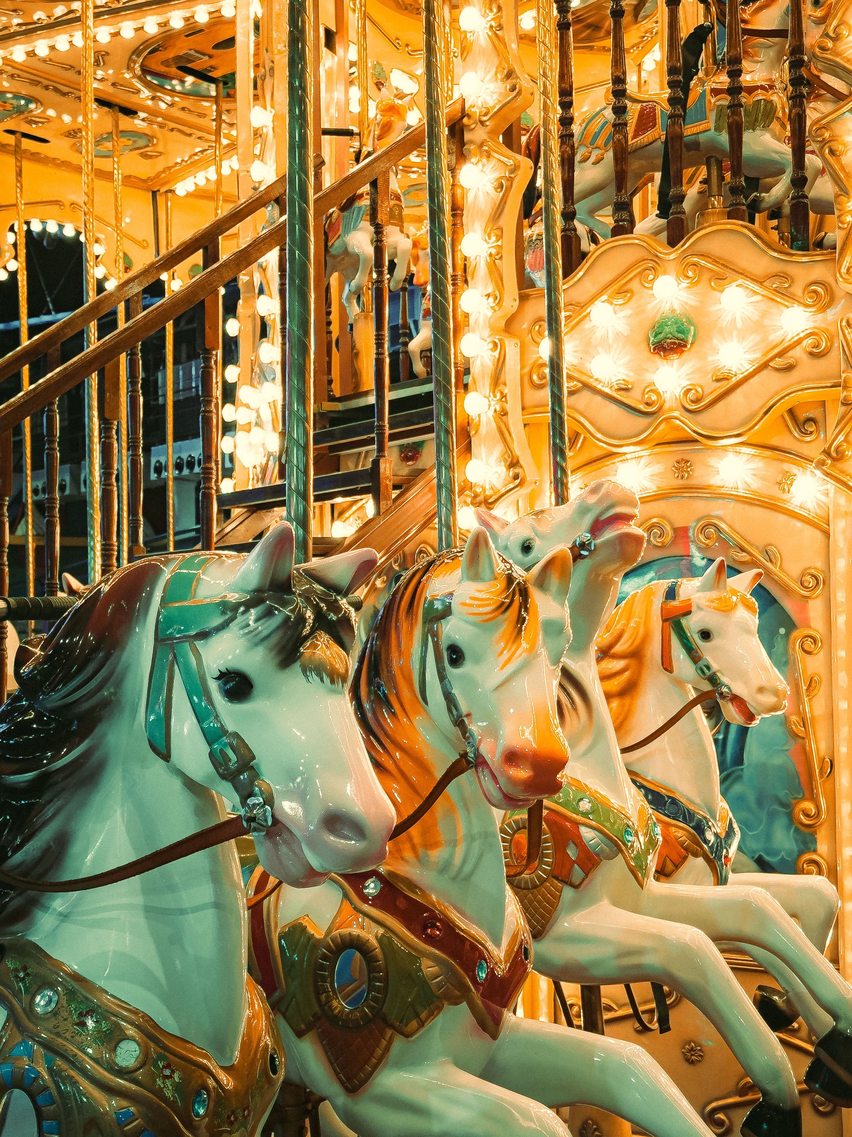 A Woman Standing at the Carousel · Free Stock Photo