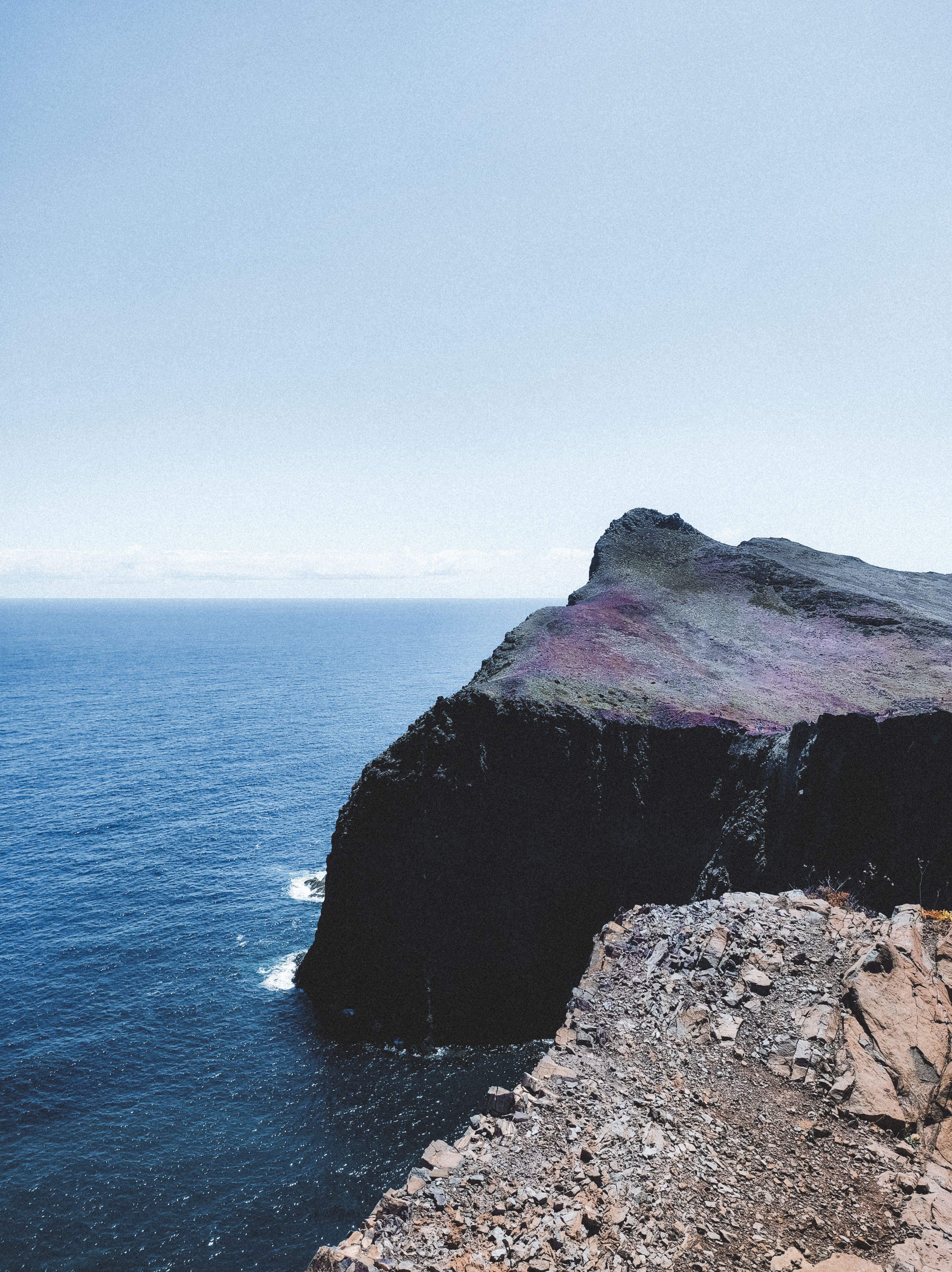 Dramatic Coastal Cliffside Overlooking Ocean · Free Stock Photo