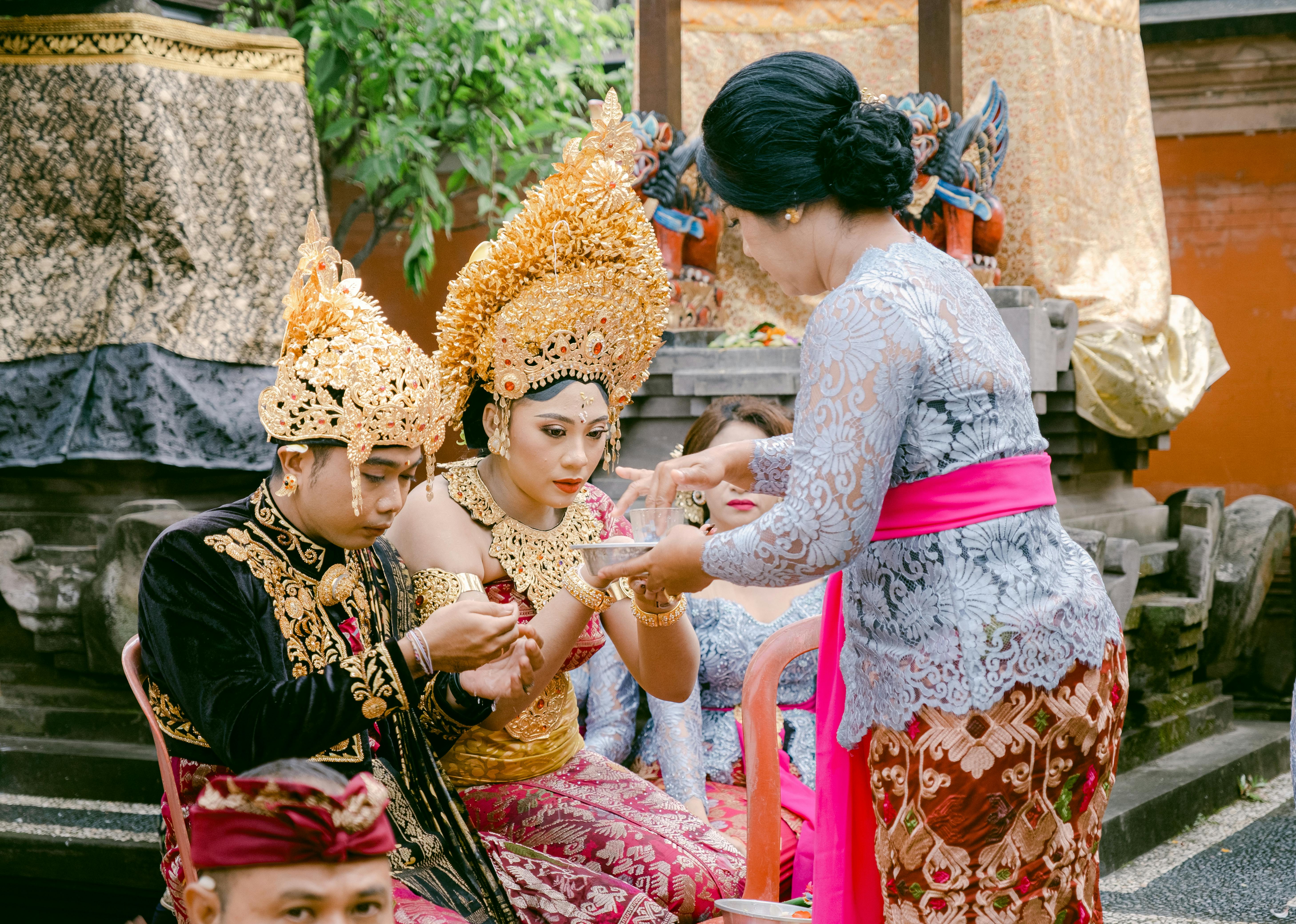 Traditional Balinese Ceremony with Ornate Costumes · Free Stock Photo