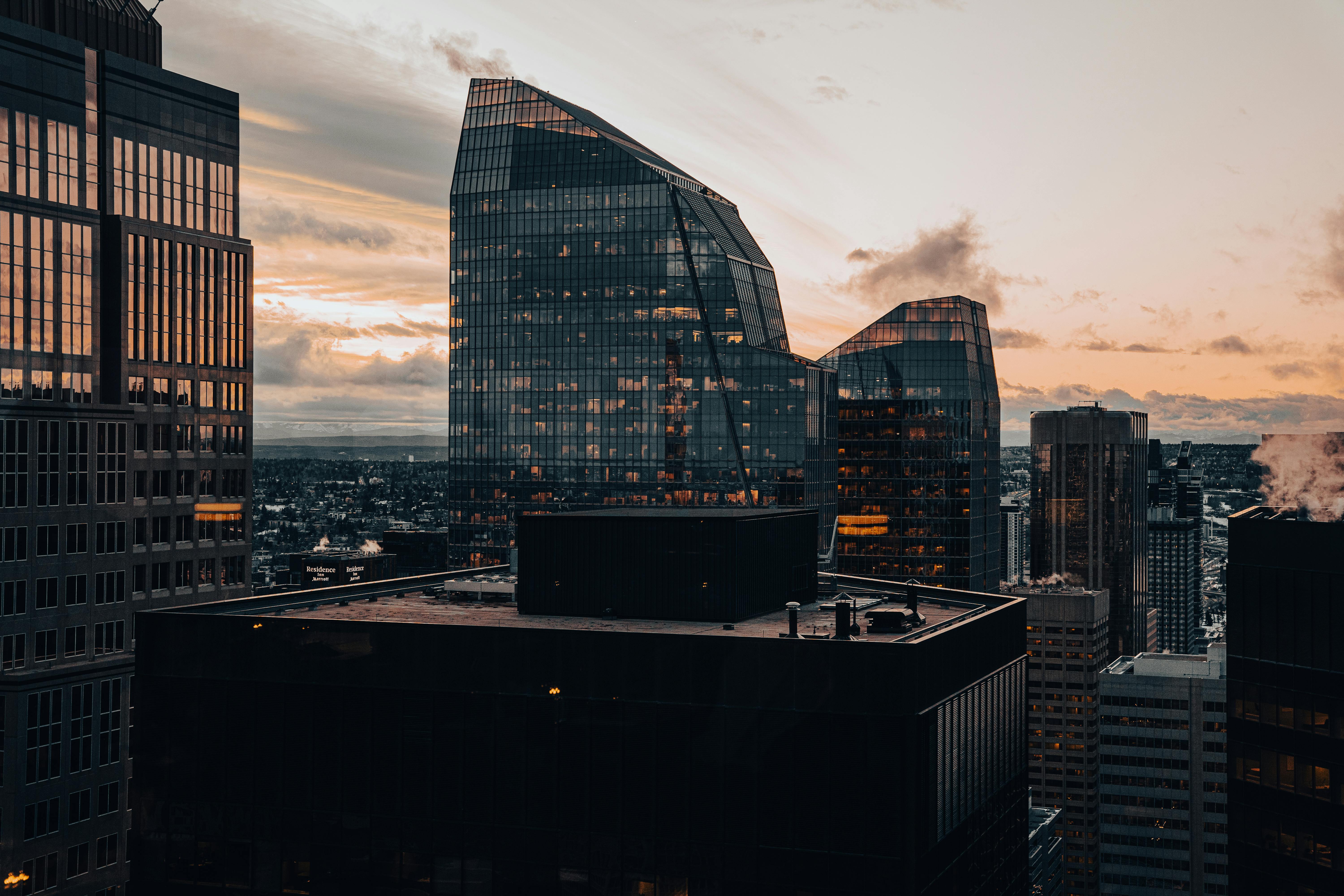Modern Urban Skyline at Sunset with Skyscrapers · Free Stock Photo