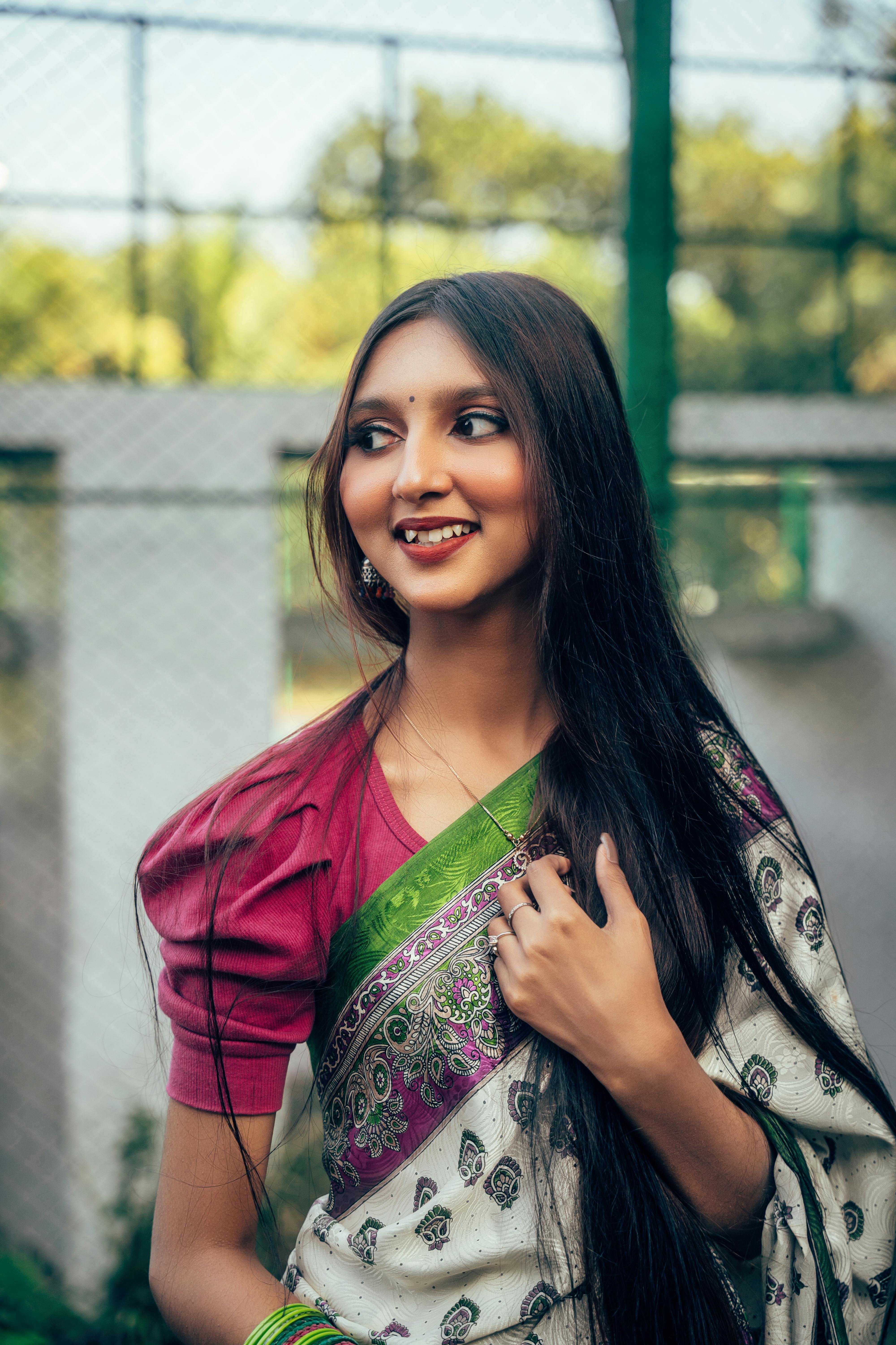 Elegant Portrait of Woman in Traditional Bengali Saree · Free Stock Photo