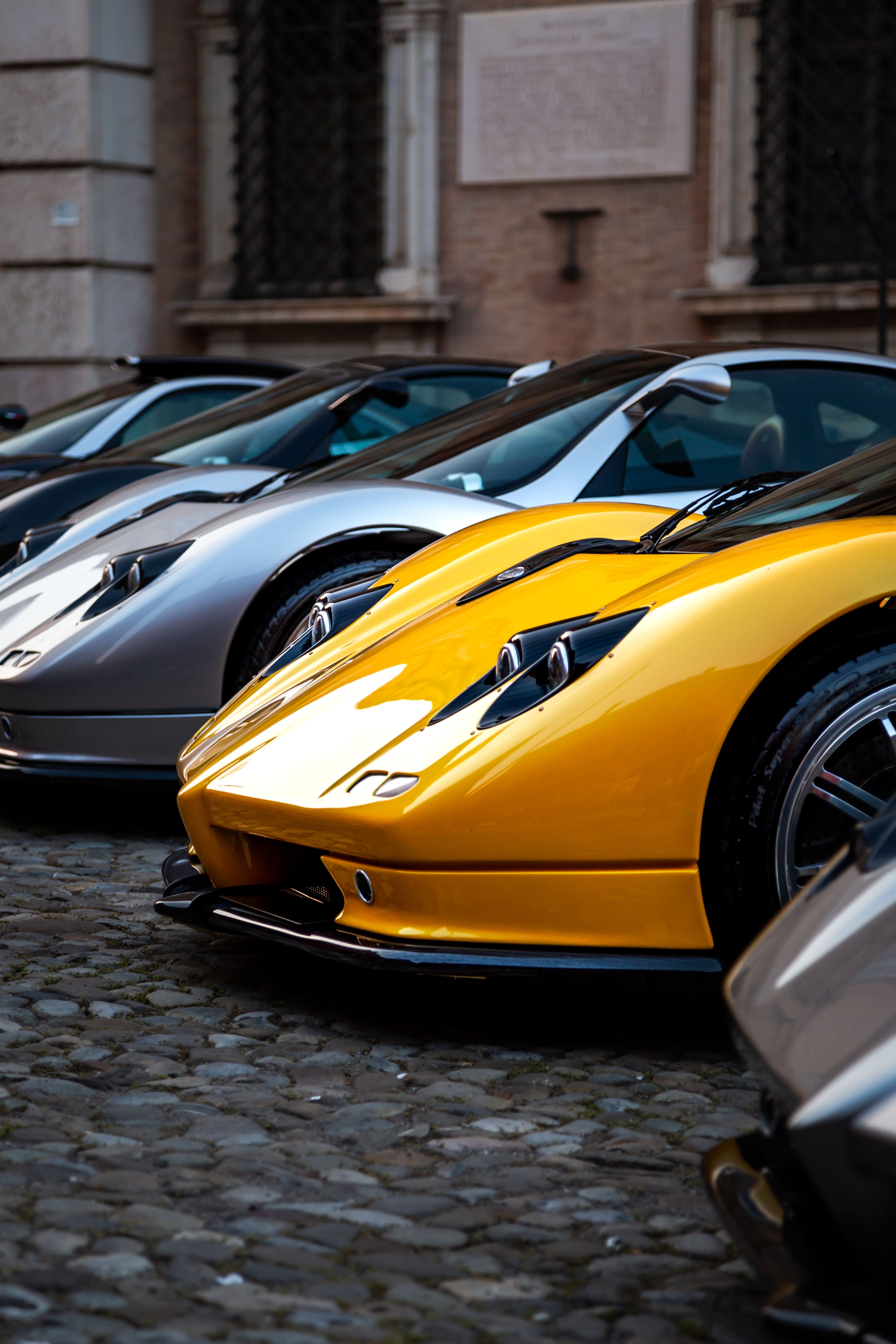 Luxurious Pagani Hypercars Lineup Display · Free Stock Photo