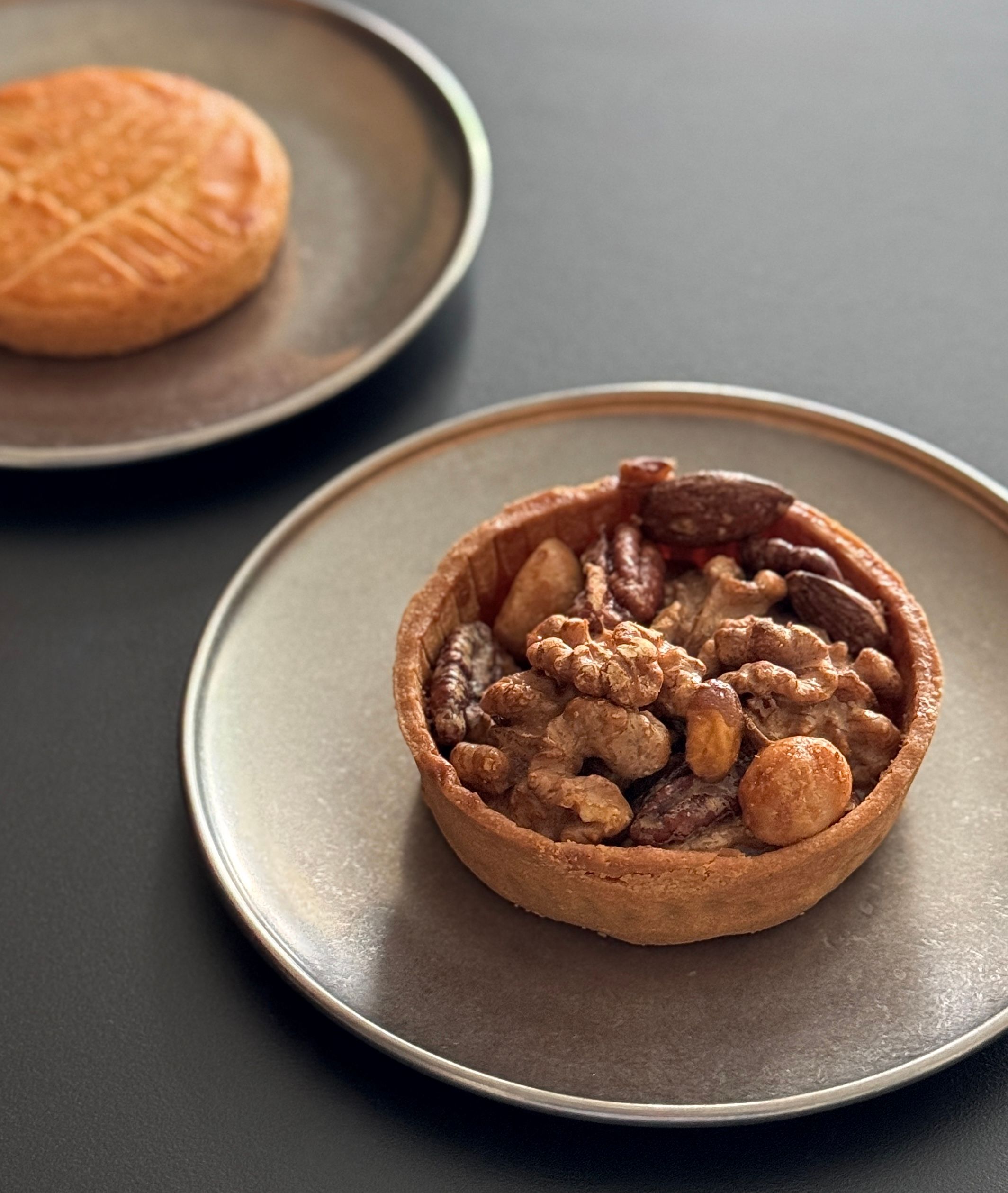 Assorted Nut Tart and Pastry on Plates · Free Stock Photo