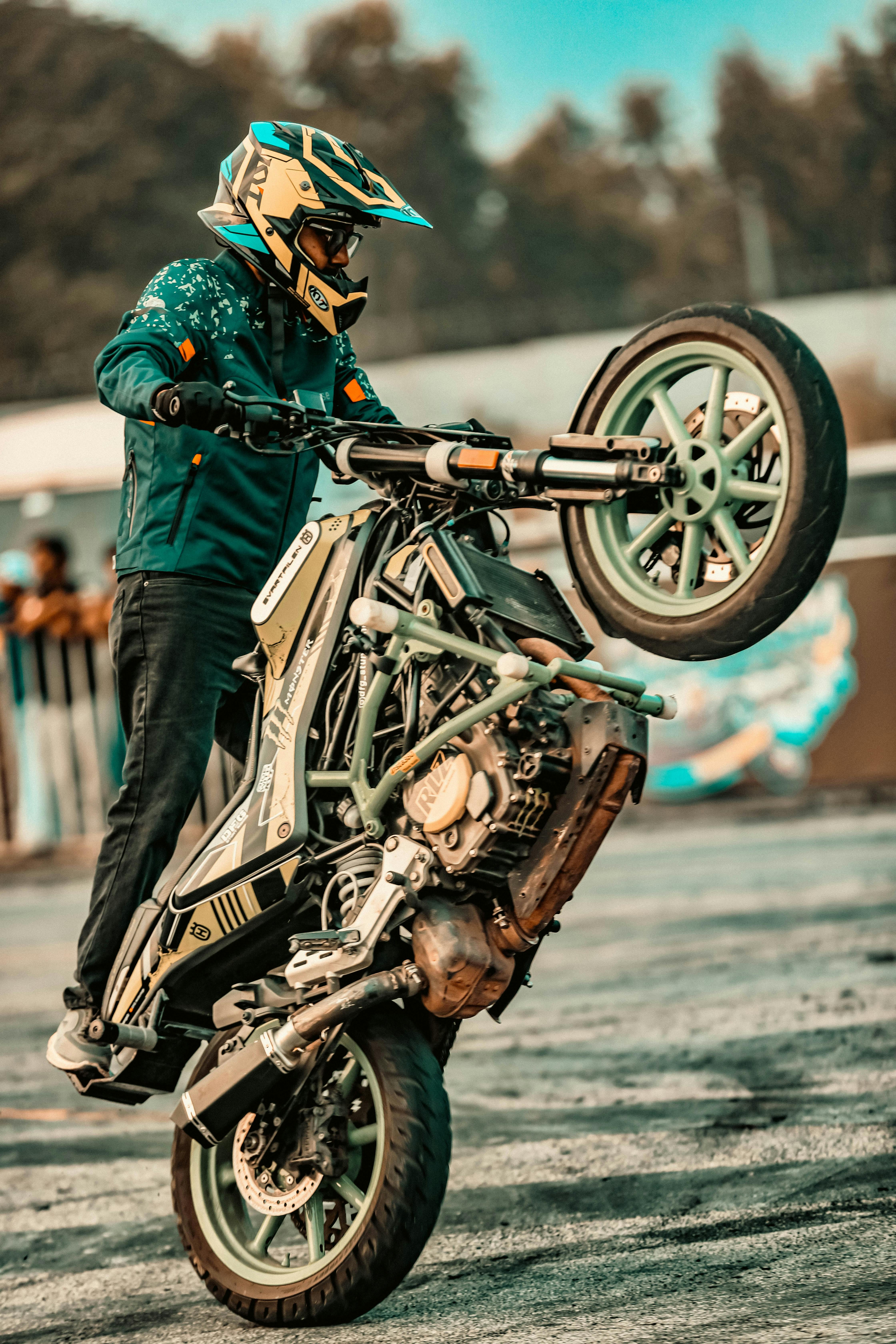 Dynamic Wheelie on City Street by Stunt Rider · Free Stock Photo