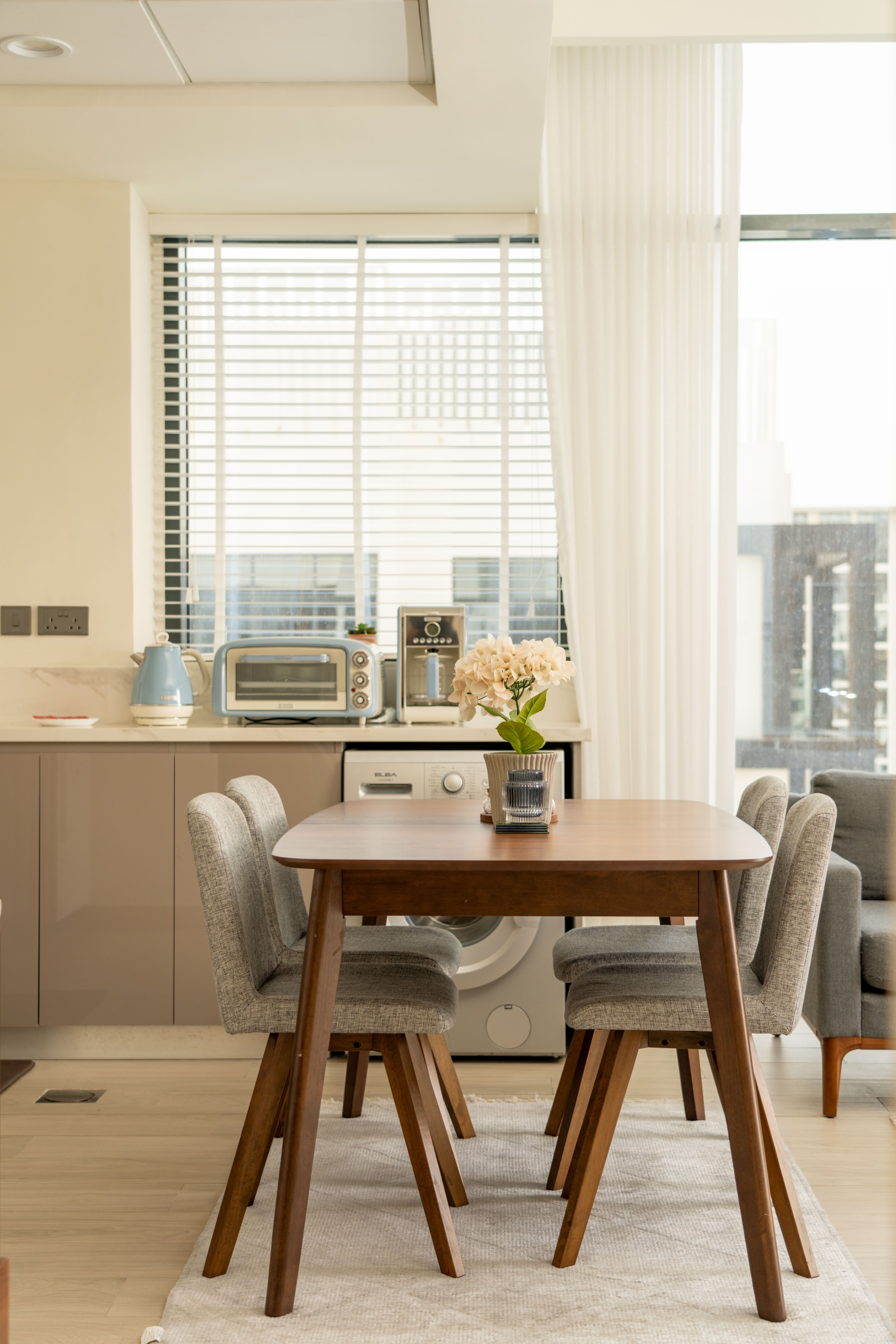 Modern Kitchen and Dining Area with Appliances · Free Stock Photo