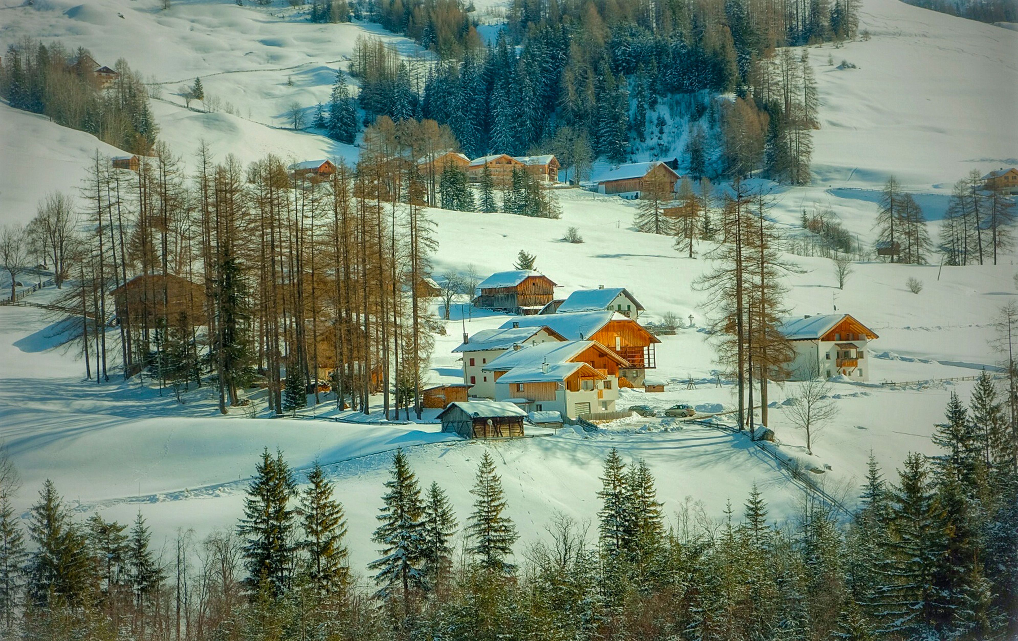 Scenic snowy alpine village in winter landscape · Free Stock Photo