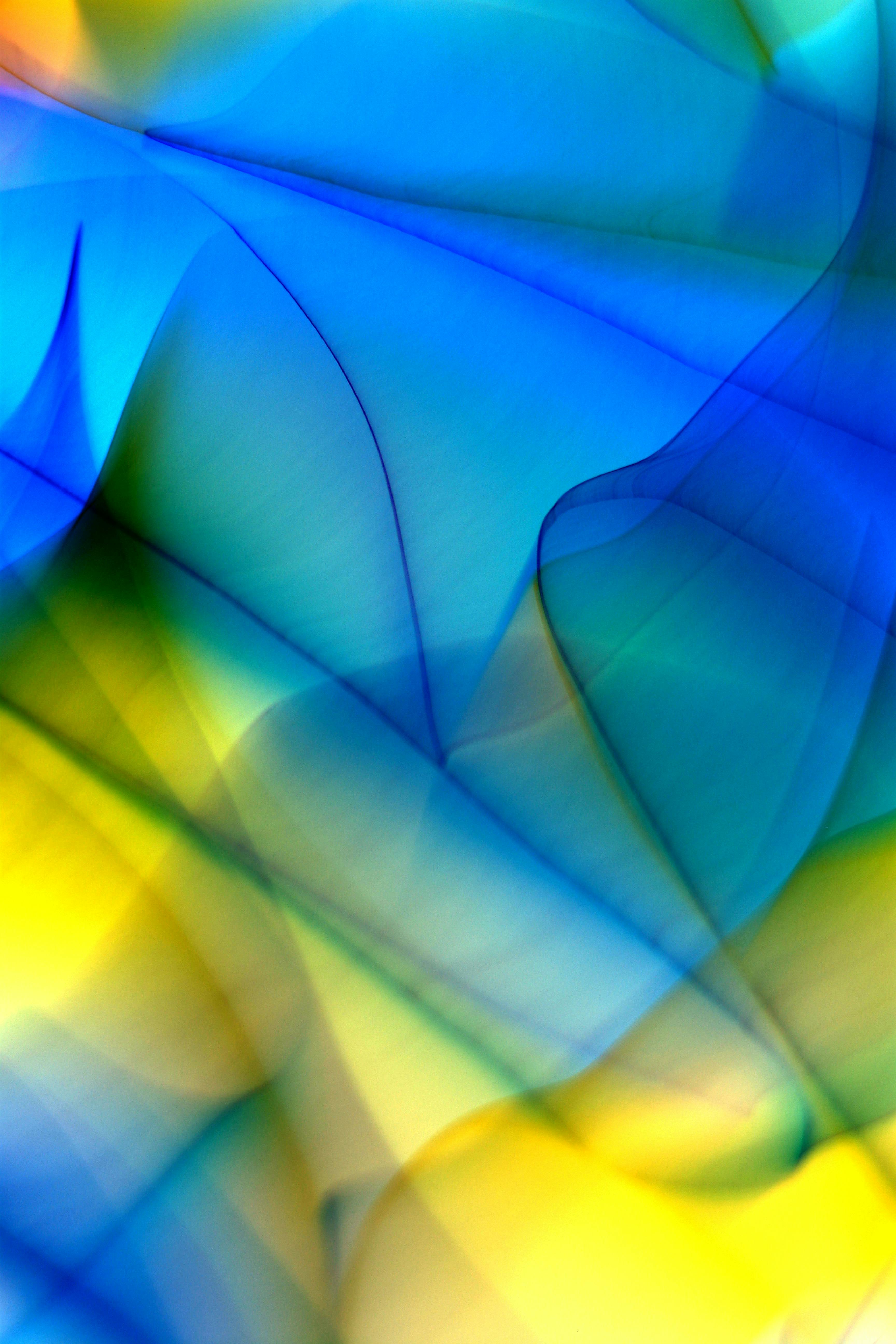 Vibrant Abstract Art with Blue and Yellow Waves · Free Stock Photo