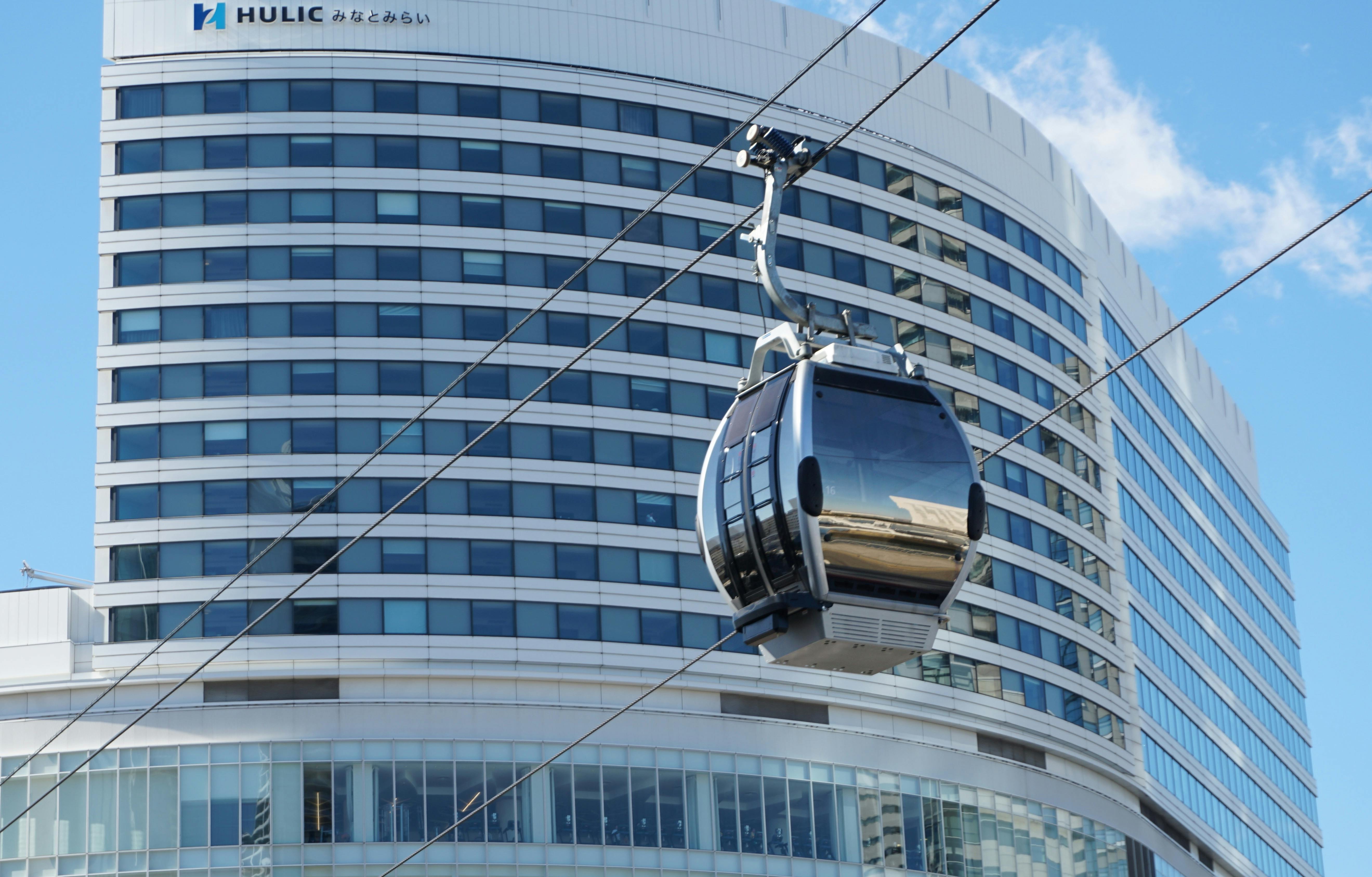 Modern Cable Car in Urban Cityscape · Free Stock Photo