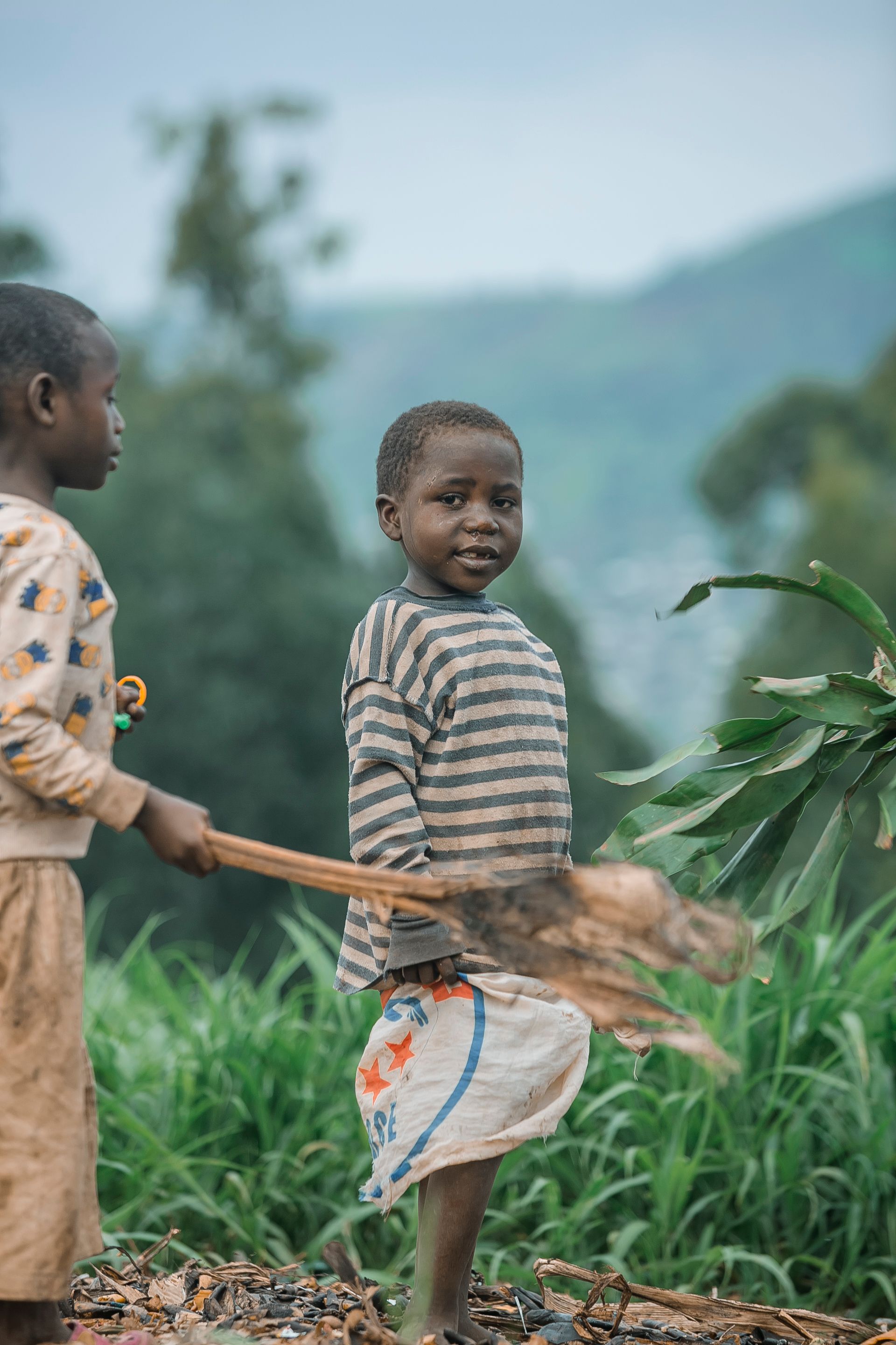 Children Playing in Vibrant Outdoor Landscape · Free Stock Photo