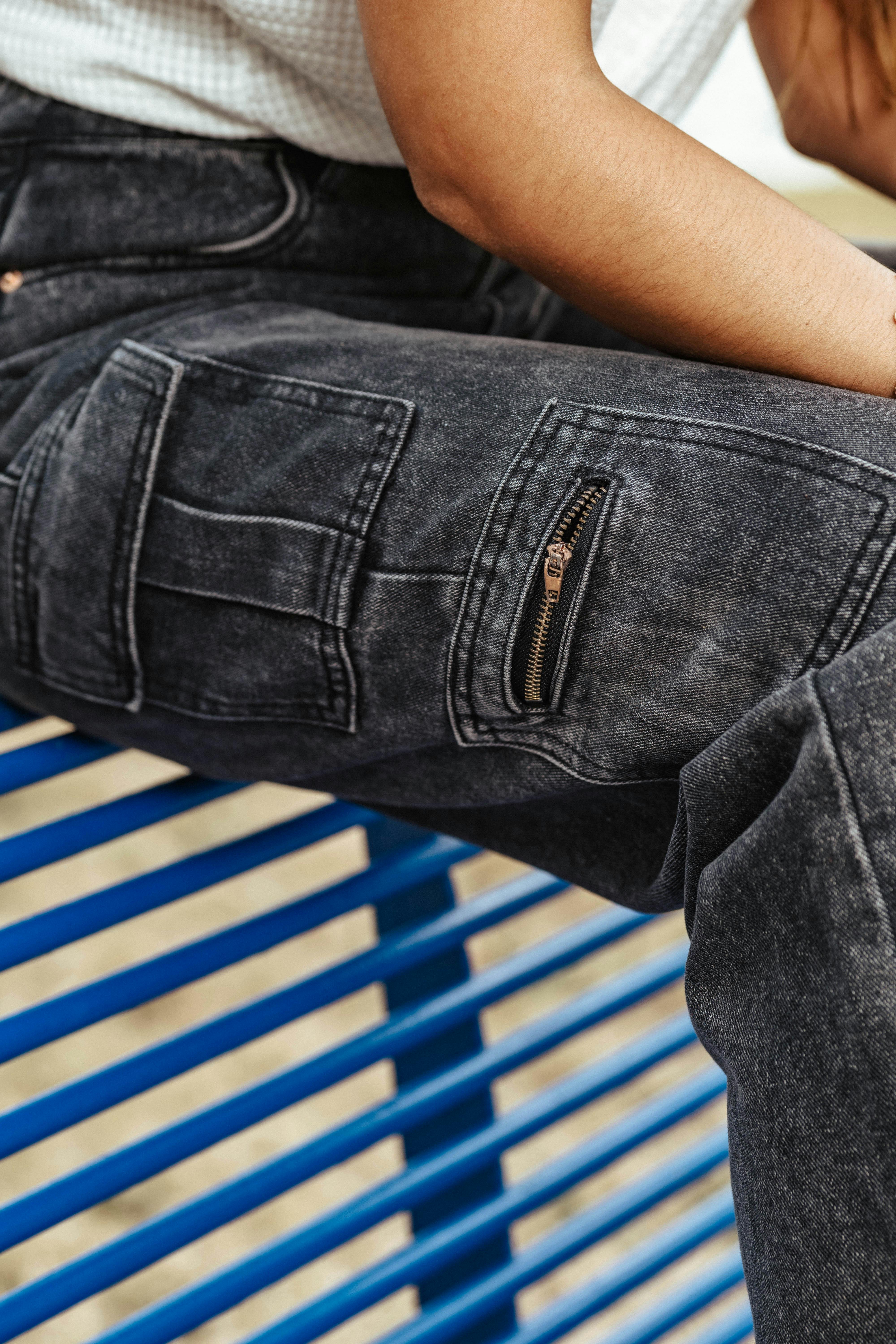 Stylish Black Cargo Jeans on Blue Bench · Free Stock Photo
