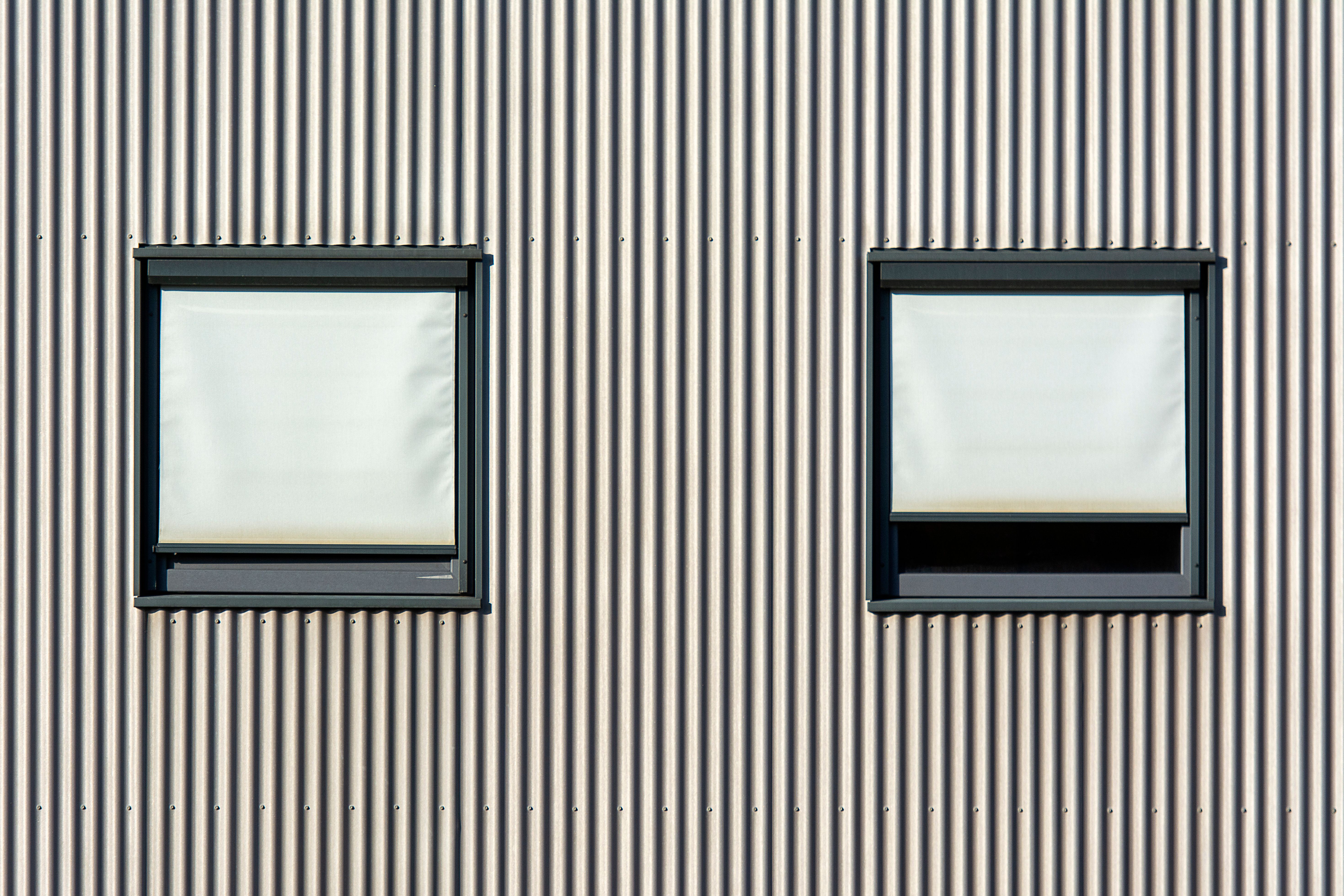 Symmetrical Facade with Striped Blinds · Free Stock Photo